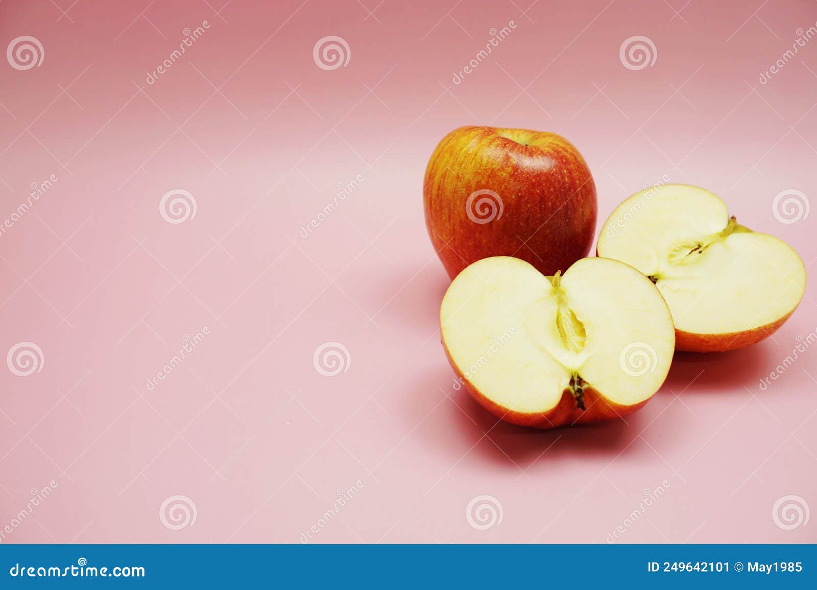 Apple Cut Half Slices with Space Copy on Pink Background Stock Image ...