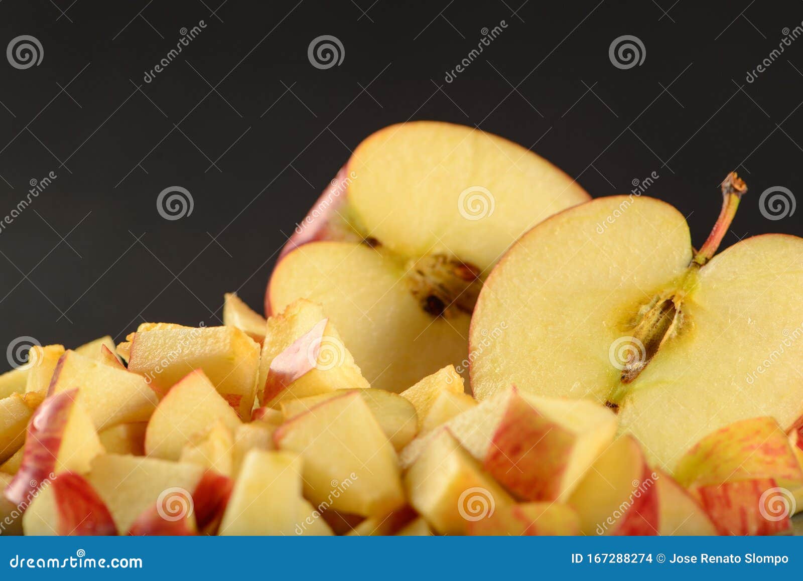 Apple Cut in Half and in Small Pieces Stock Photo - Image of food ...
