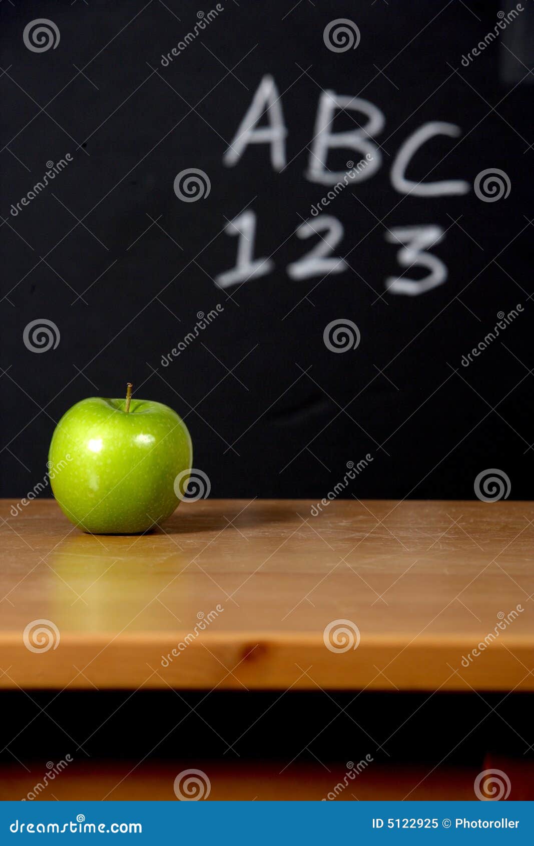 Apple on a desk stock image. Image of eraser, chart, desk - 5122925