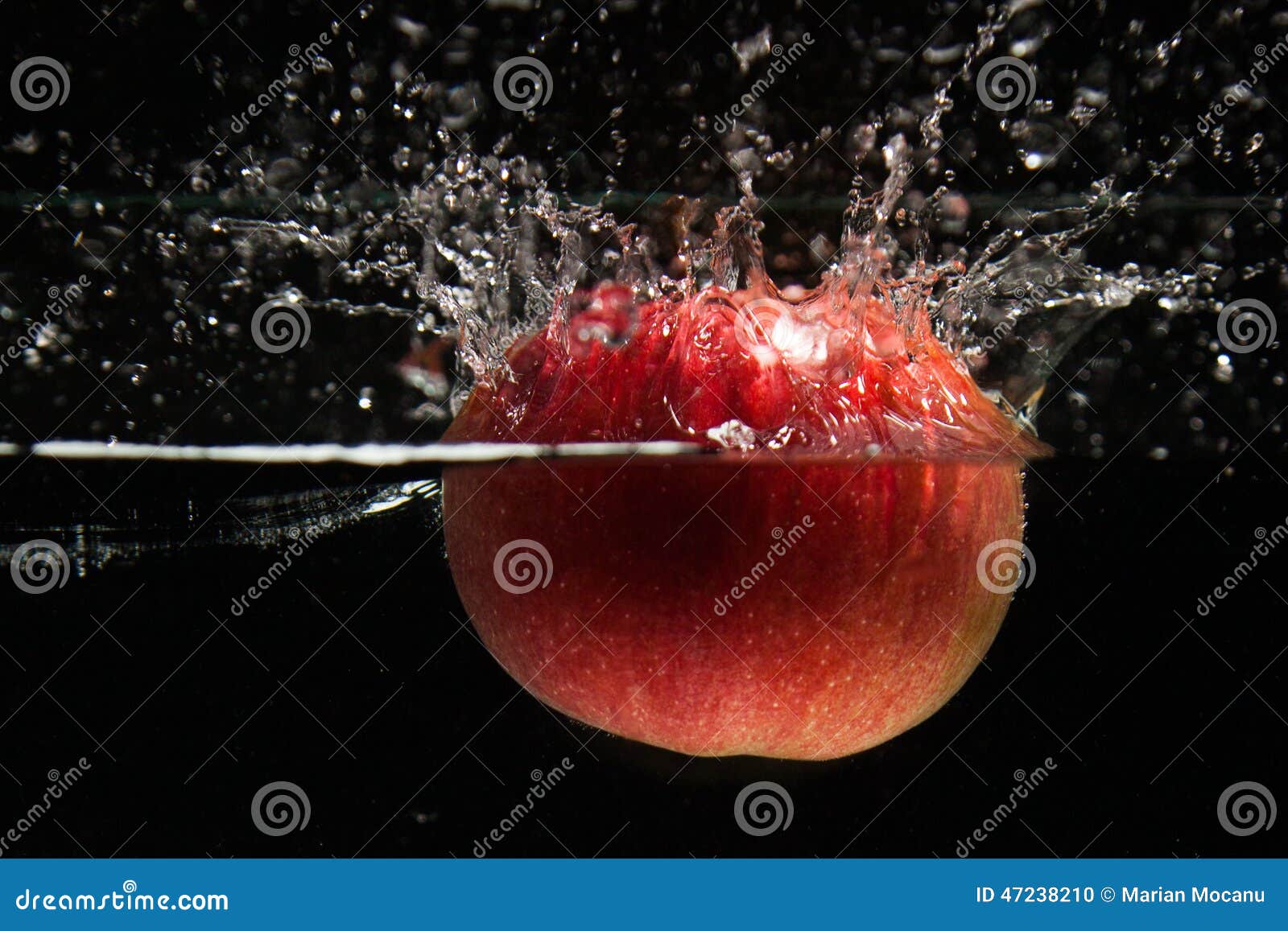 Apple Falling Into The Water With Splash On White Stock Photography ...