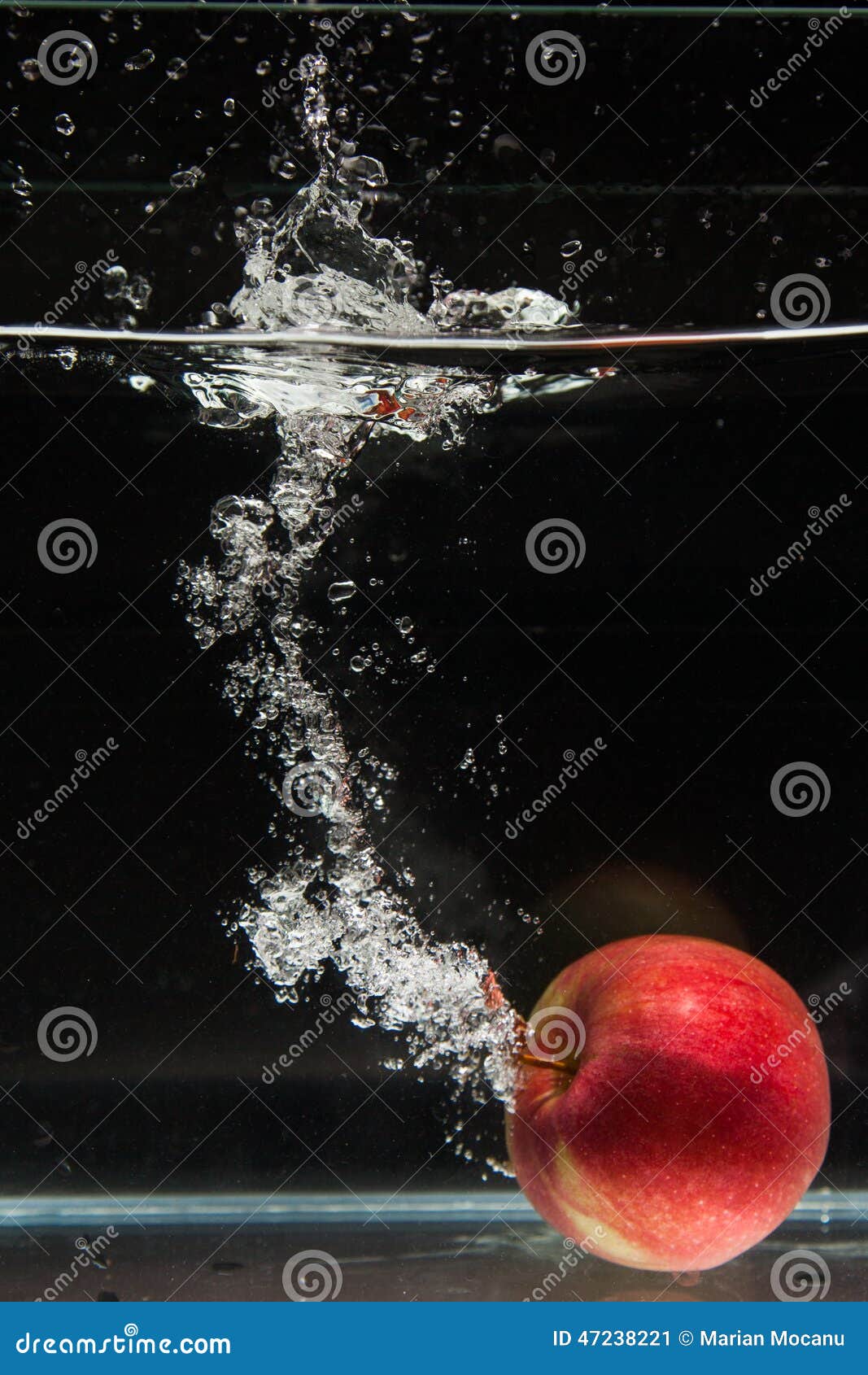 Red Apple Falling Into The Water With A Splash Royalty-Free Stock Image ...