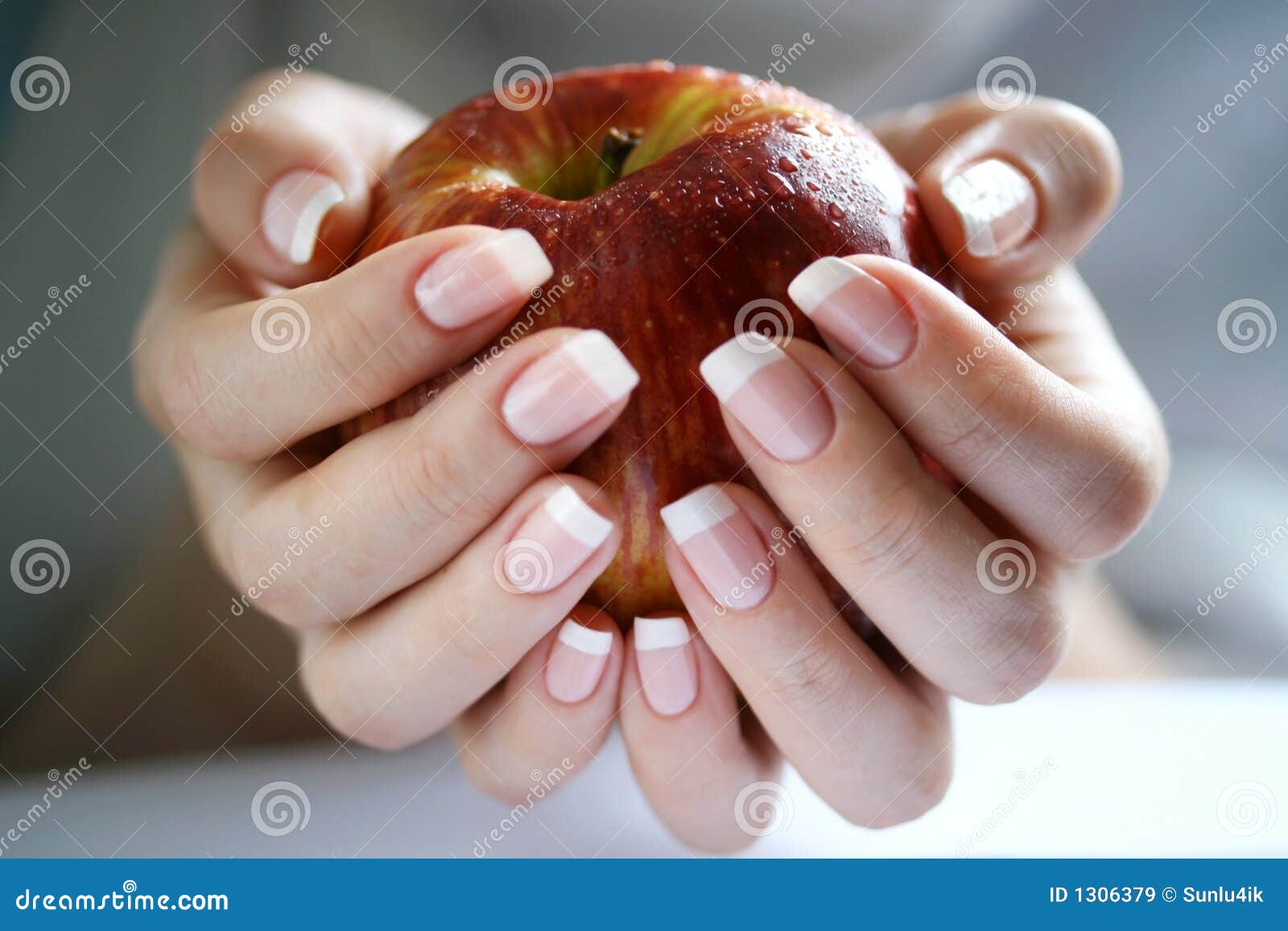 Apple in a female hand stock image. Image of apple, gesture - 1306379