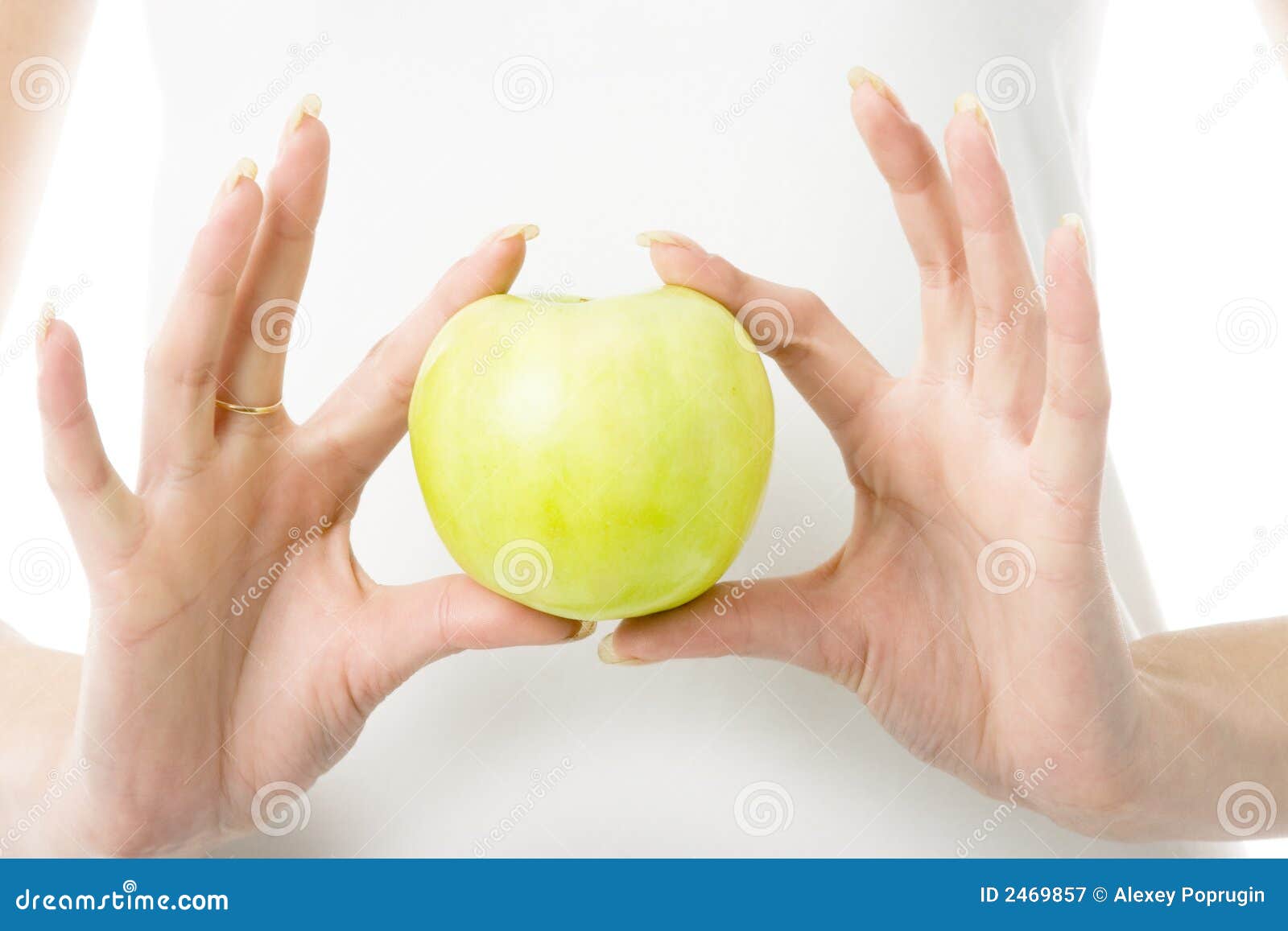 Apple in fingers stock image. Image of female, advertise - 2469857
