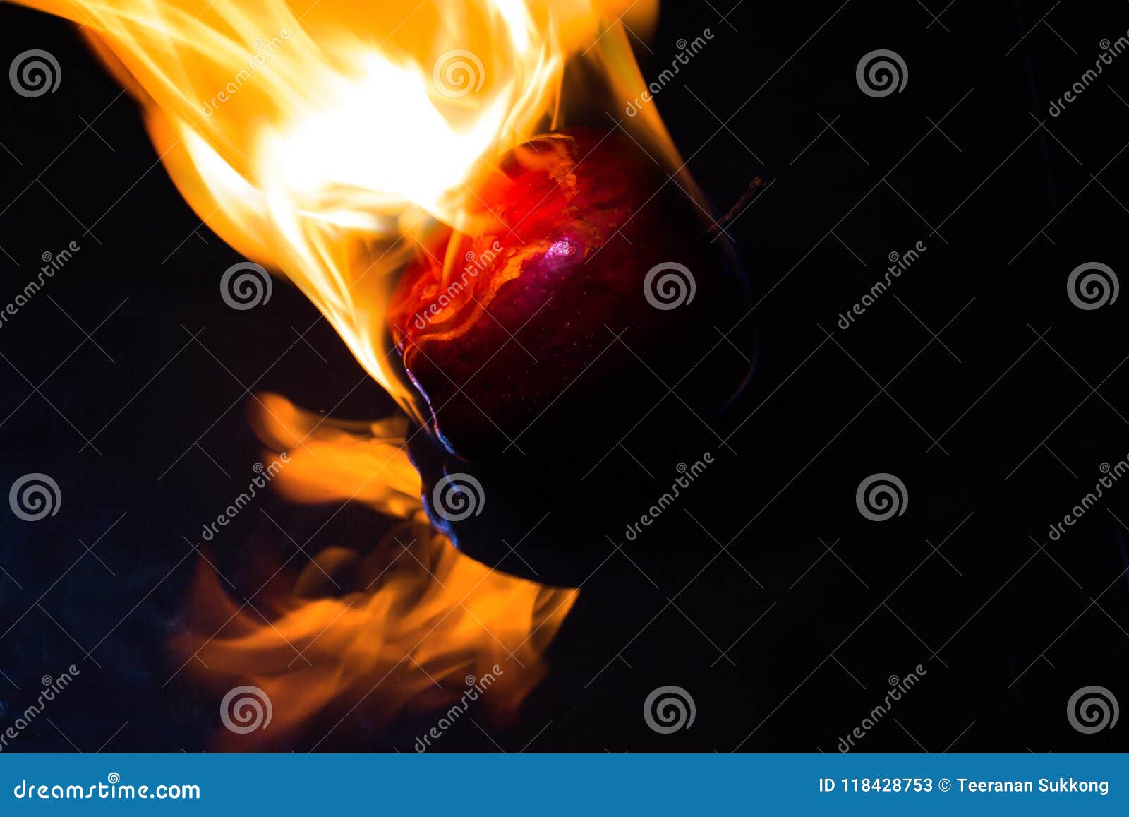 Apple hit the fire tribe. stock image. Image of fire - 118428753