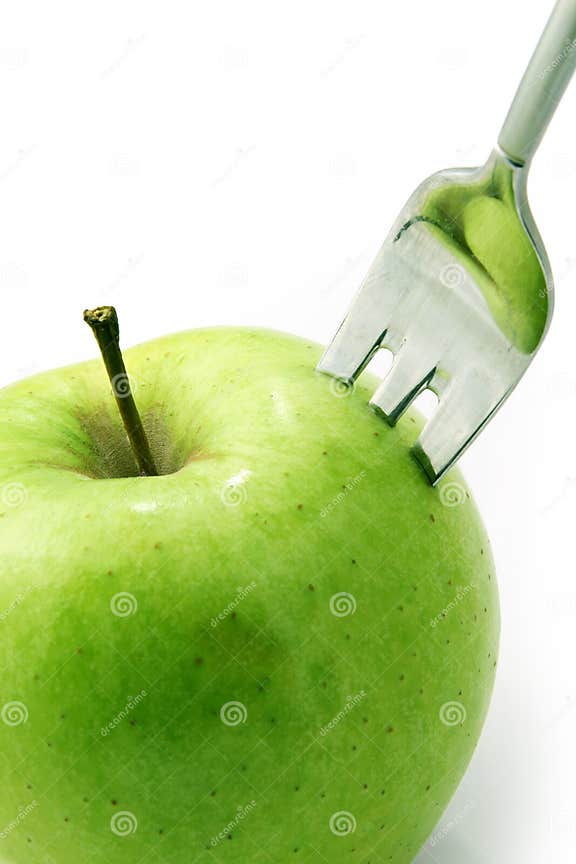 Apple with fork, close-up stock image. Image of close - 4122067