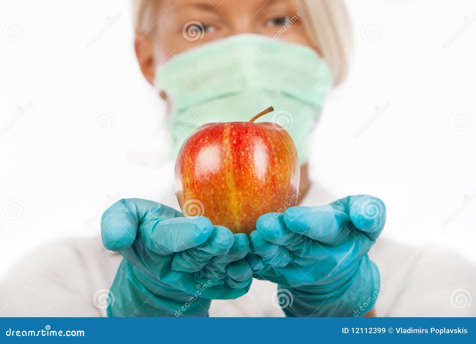 Apple in hands of doctor stock image. Image of gloves - 12112399