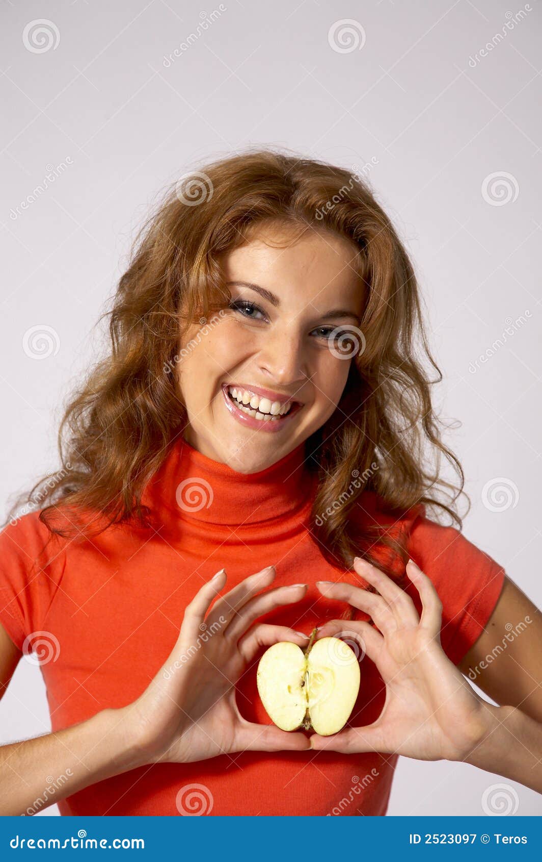 Apple on heart stock image. Image of attractive, brunette - 2523097