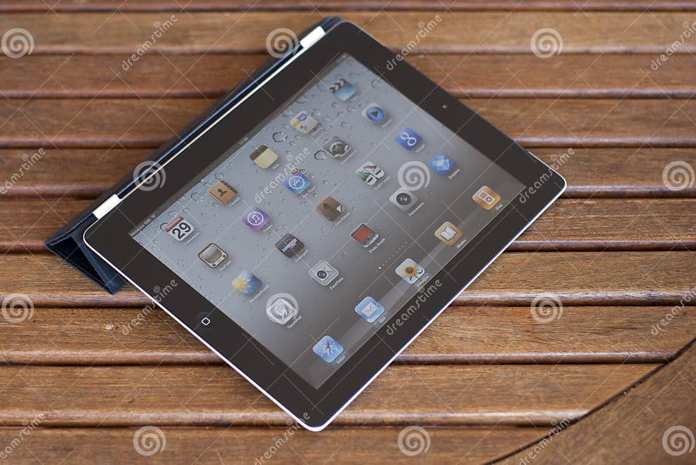 Apple Ipad 2 on a Wooden Table Editorial Stock Photo - Image of ...