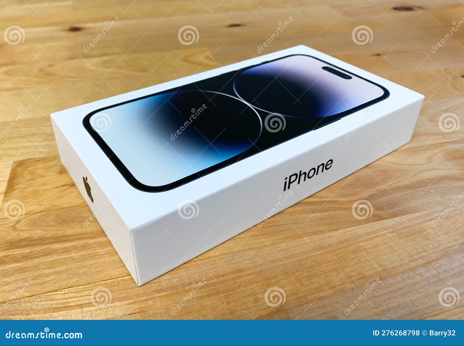 Apple IPhone 14 Pro in Box on Wooden Desk, Angled Side View. Editorial ...
