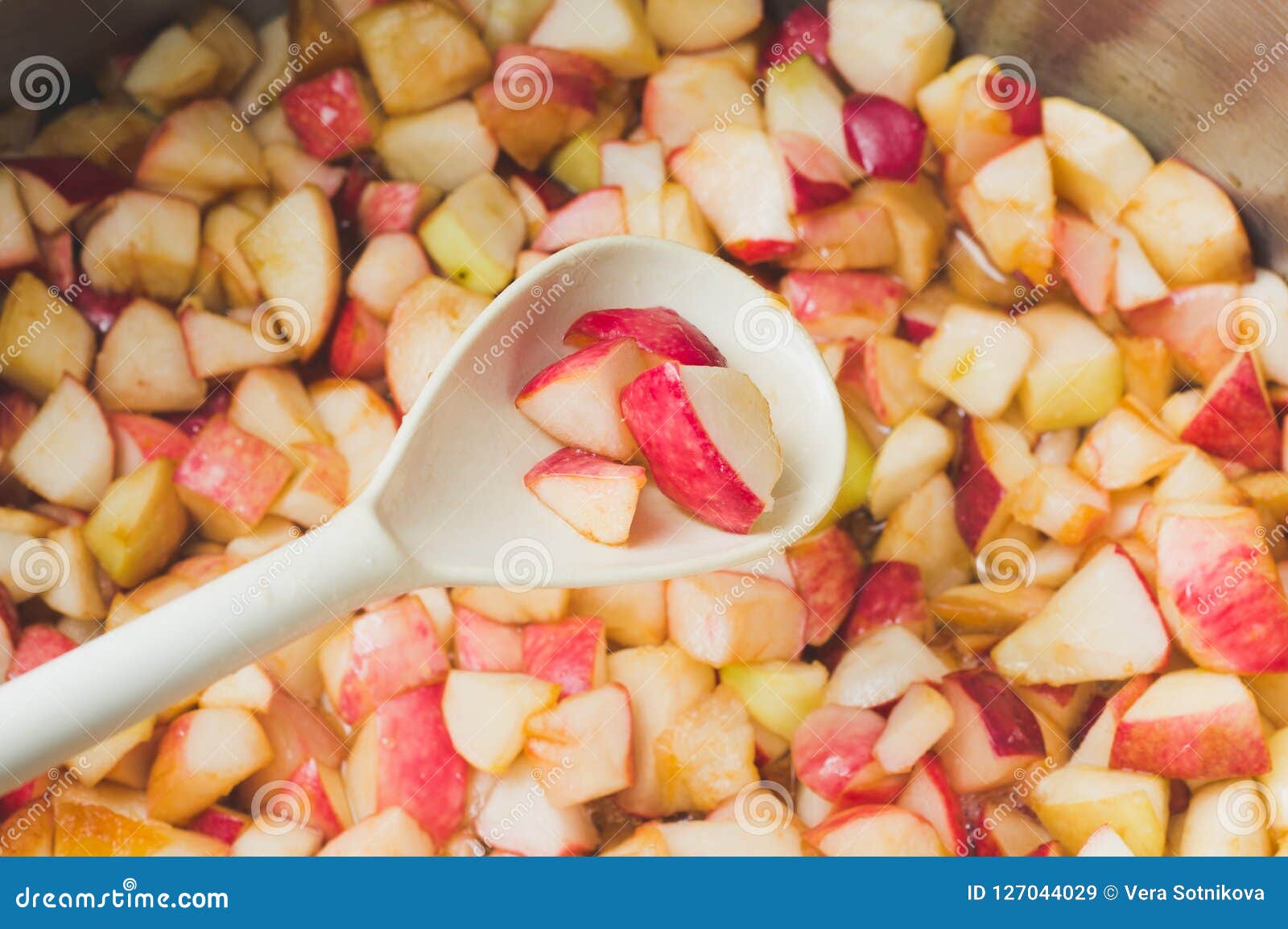 Apple Jam Making in Process, Focus on the Apple Pieces Cupping U Stock ...