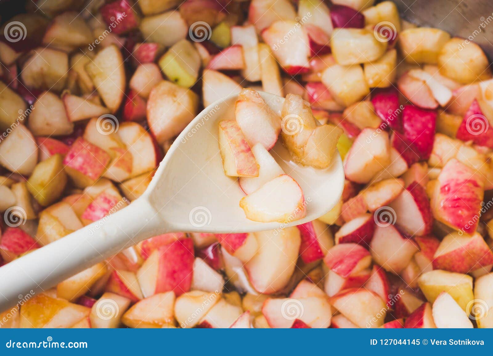 Apple Jam Making in Process, Focus on the Apple Pieces Cupping U Stock ...