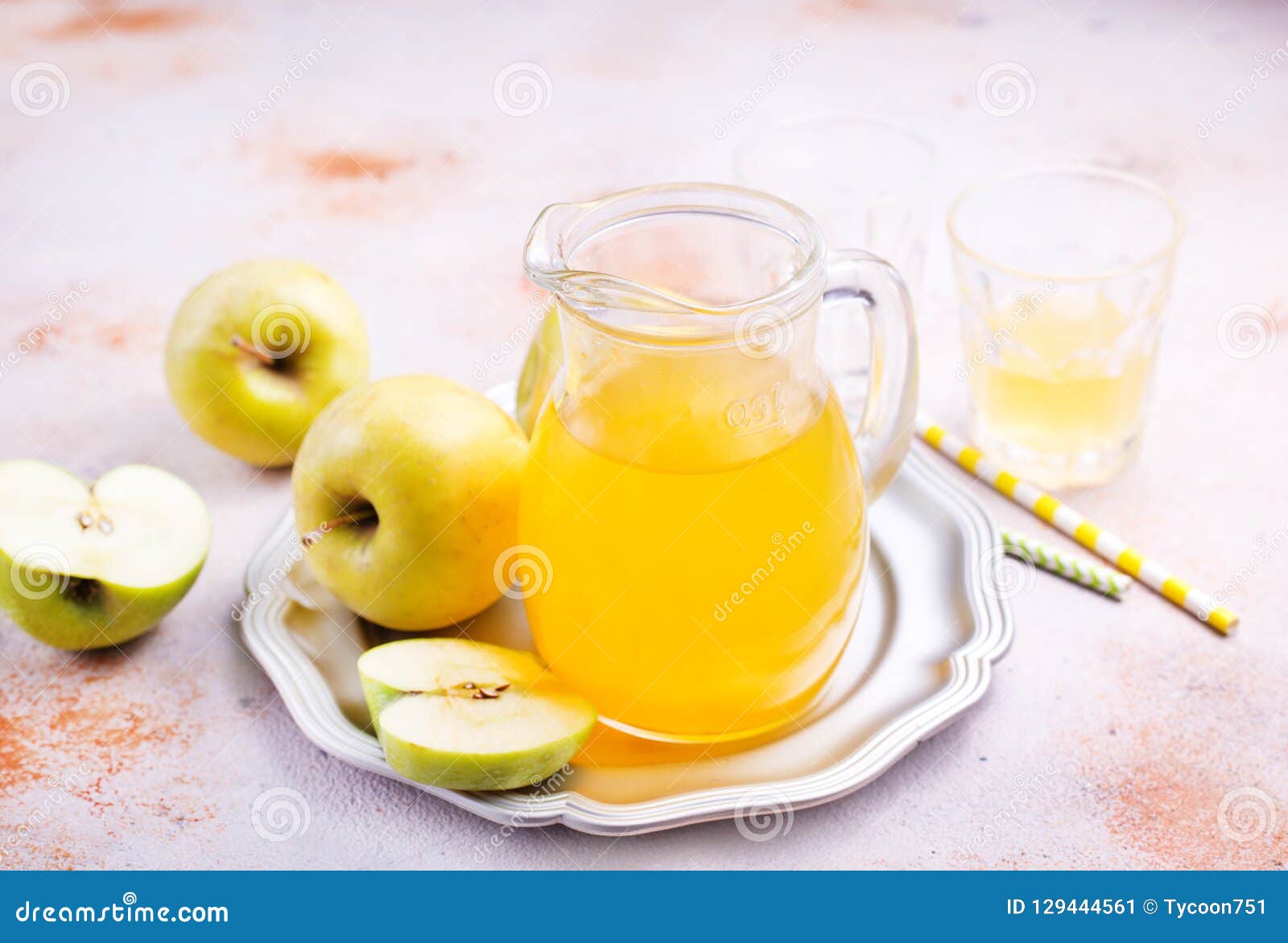 Apple juice in jug stock image. Image of season, drop - 129444561