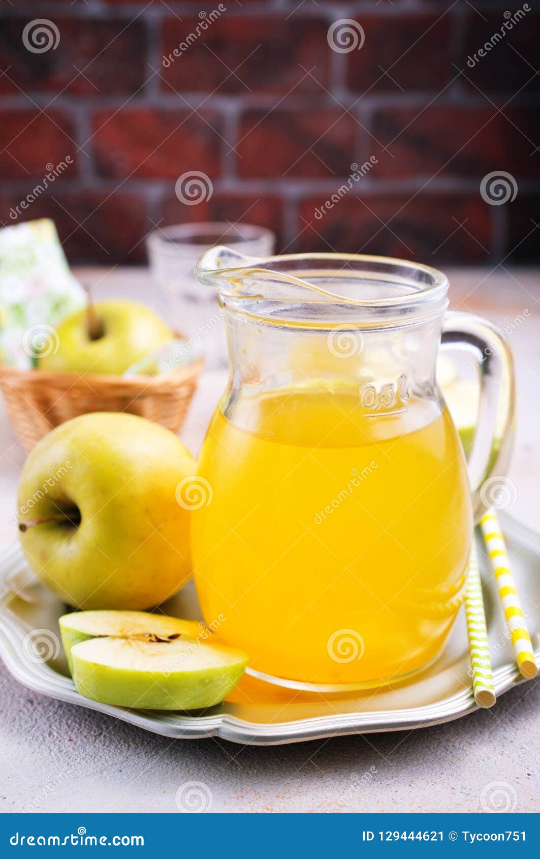 Apple juice in jug stock image. Image of juicy, delicious - 129444621