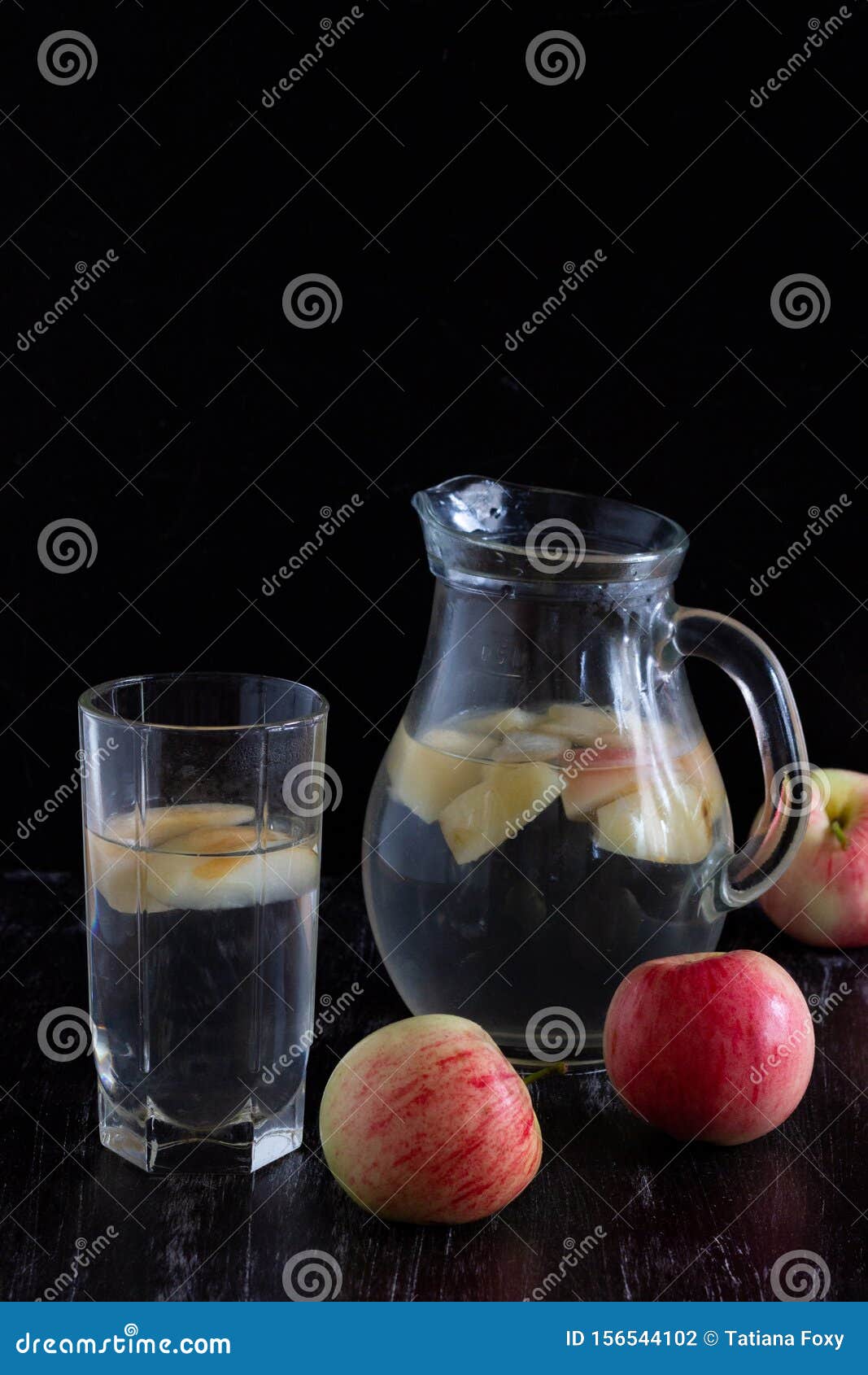 Apple Kompot in Glass Bottle on the Black Background Stock Photo ...