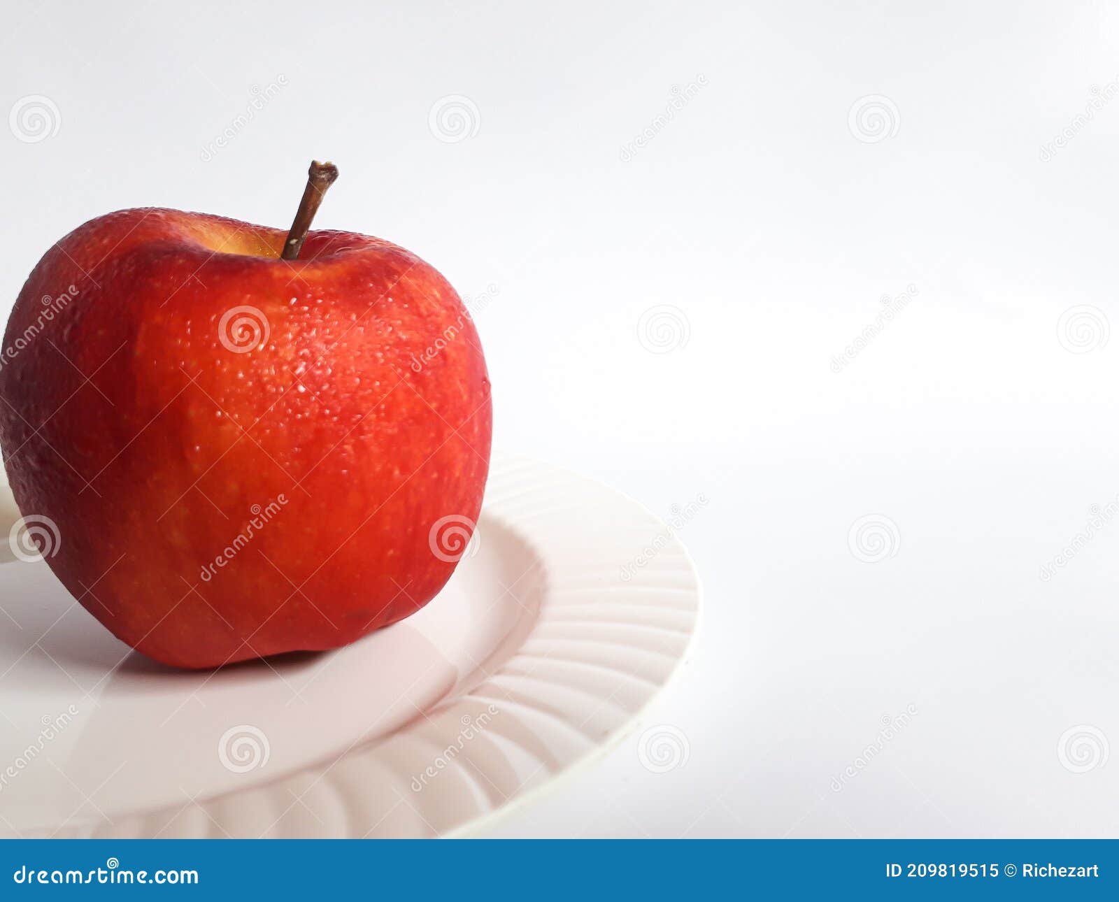 Apple in the Left Side with White Background Stock Image - Image of ...