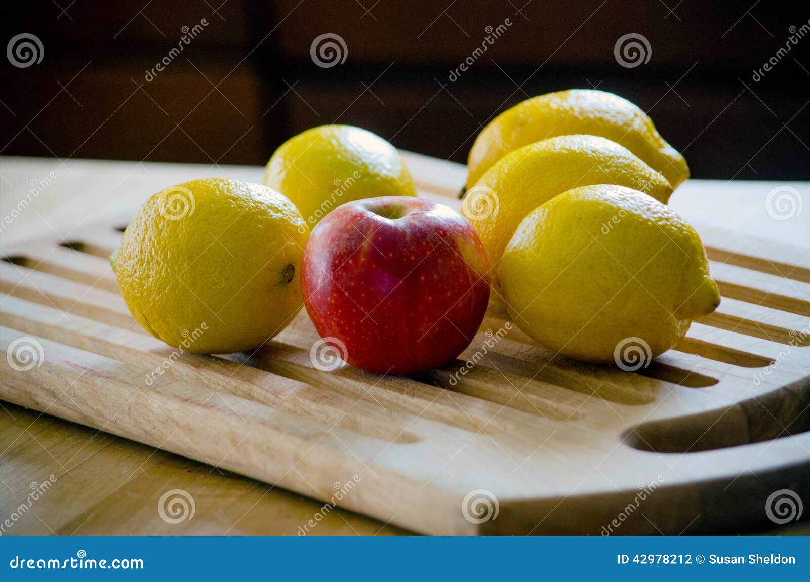 Apple and lemons stock photo. Image of kitchen, board - 42978212