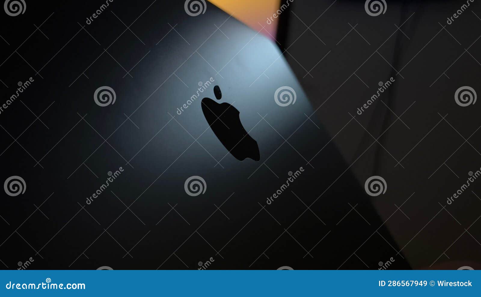 An Apple Logo on the Back of a Macbook Pro Editorial Stock Image ...