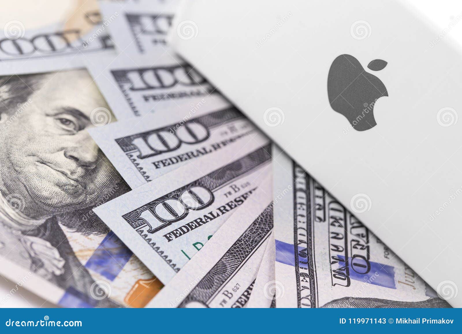 Apple Logo on the Box, Dollars. Apple is a Multinational Technology ...