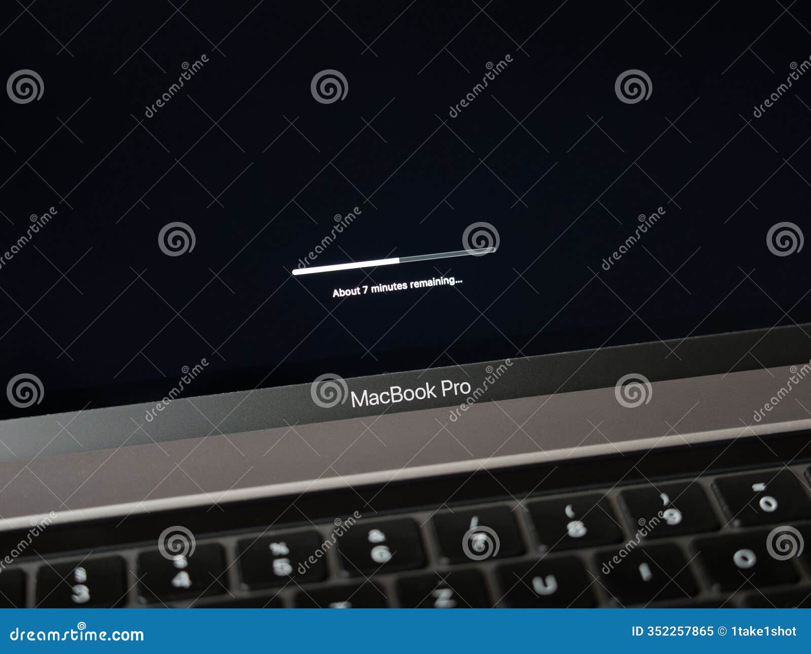 Apple MacBook Pro Installing an Update Editorial Image - Image of ...