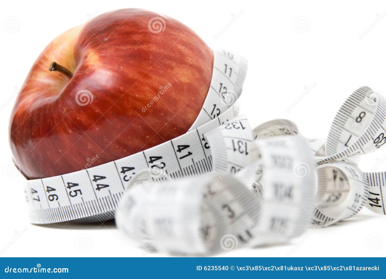 Apple with measuring tape stock photo. Image of tape, length - 6235540
