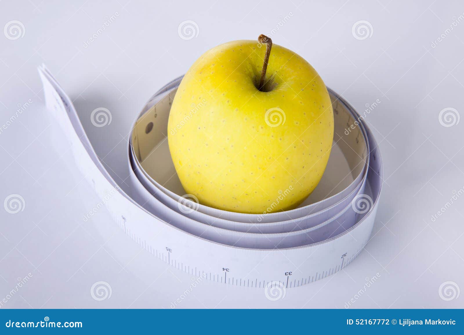 Apple and measuring tape stock photo. Image of yellow - 52167772
