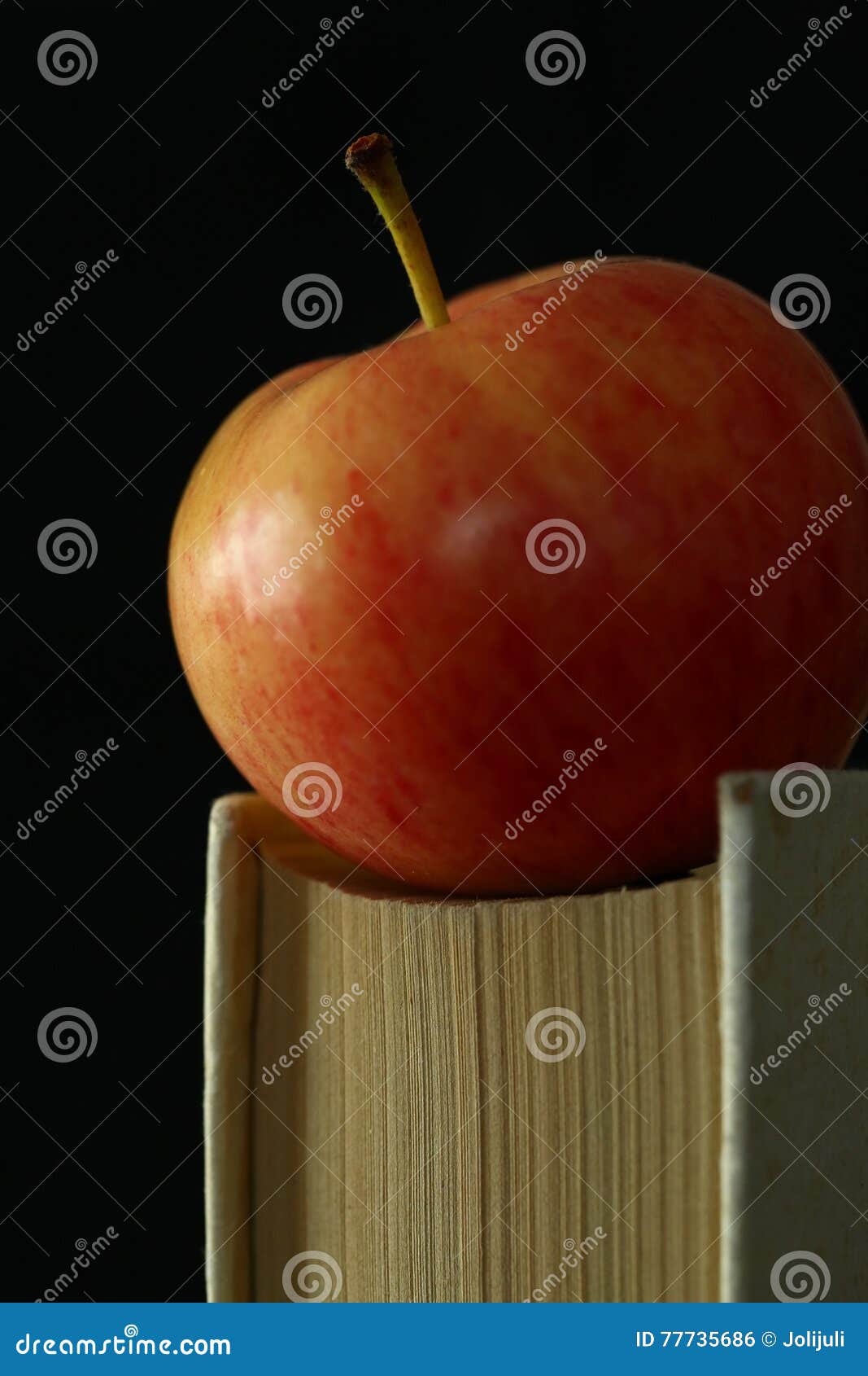 Apple and old book stock photo. Image of background, knowledge - 77735686