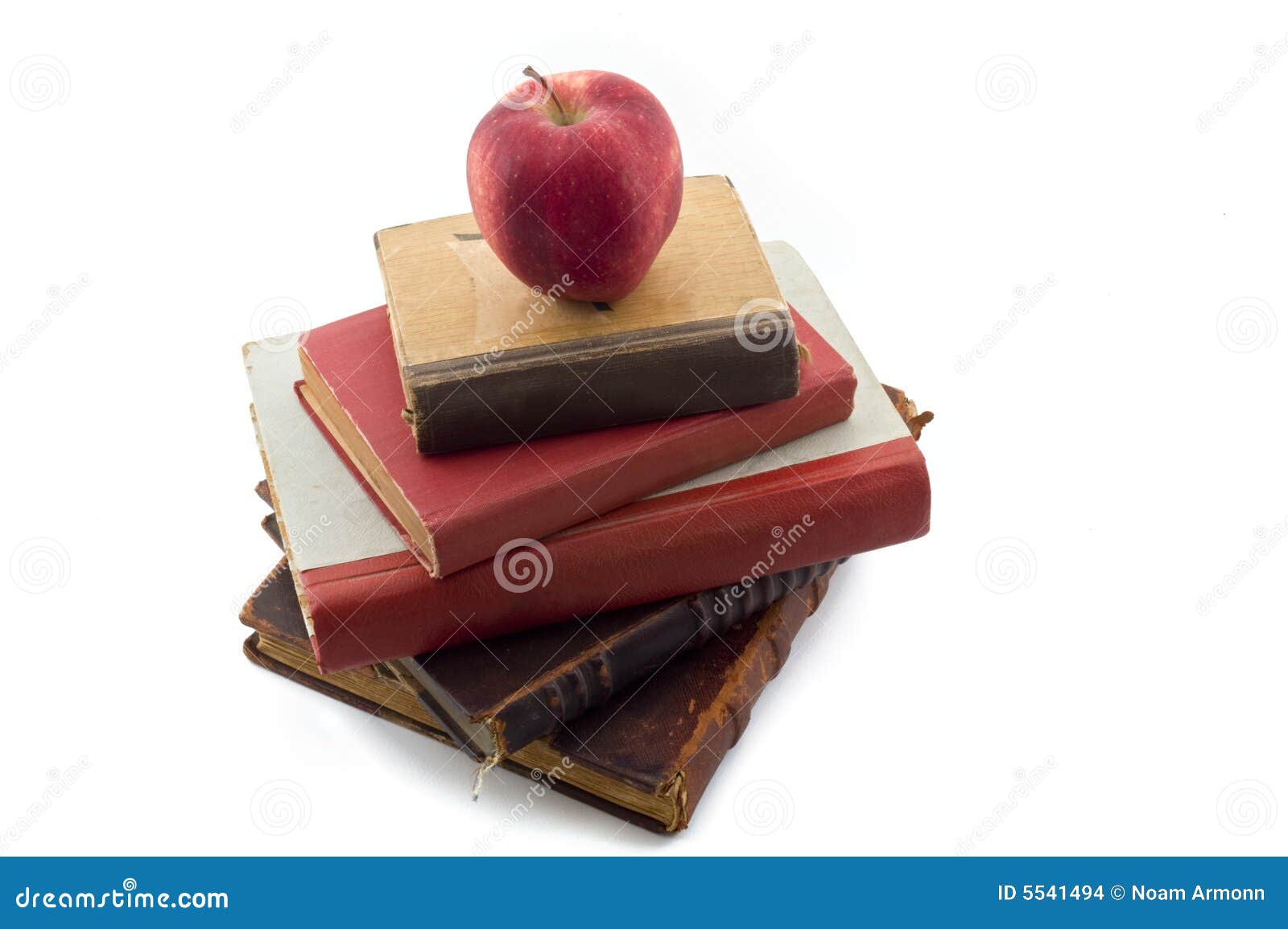 Apple on old books stock photo. Image of antique, fruit - 5541494