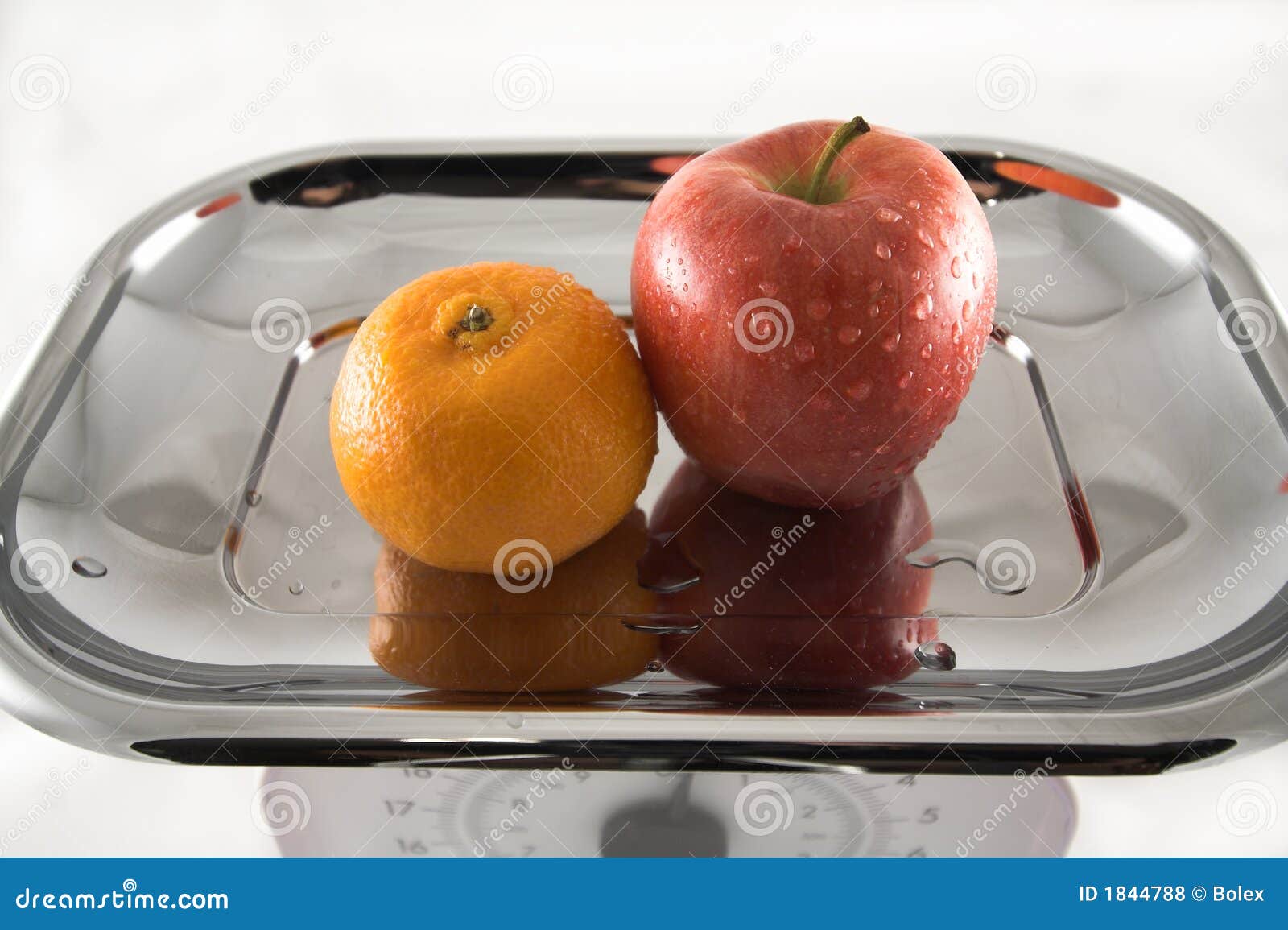 Apple And Orange Genetically Modified Symbiosis. Isolated On White ...