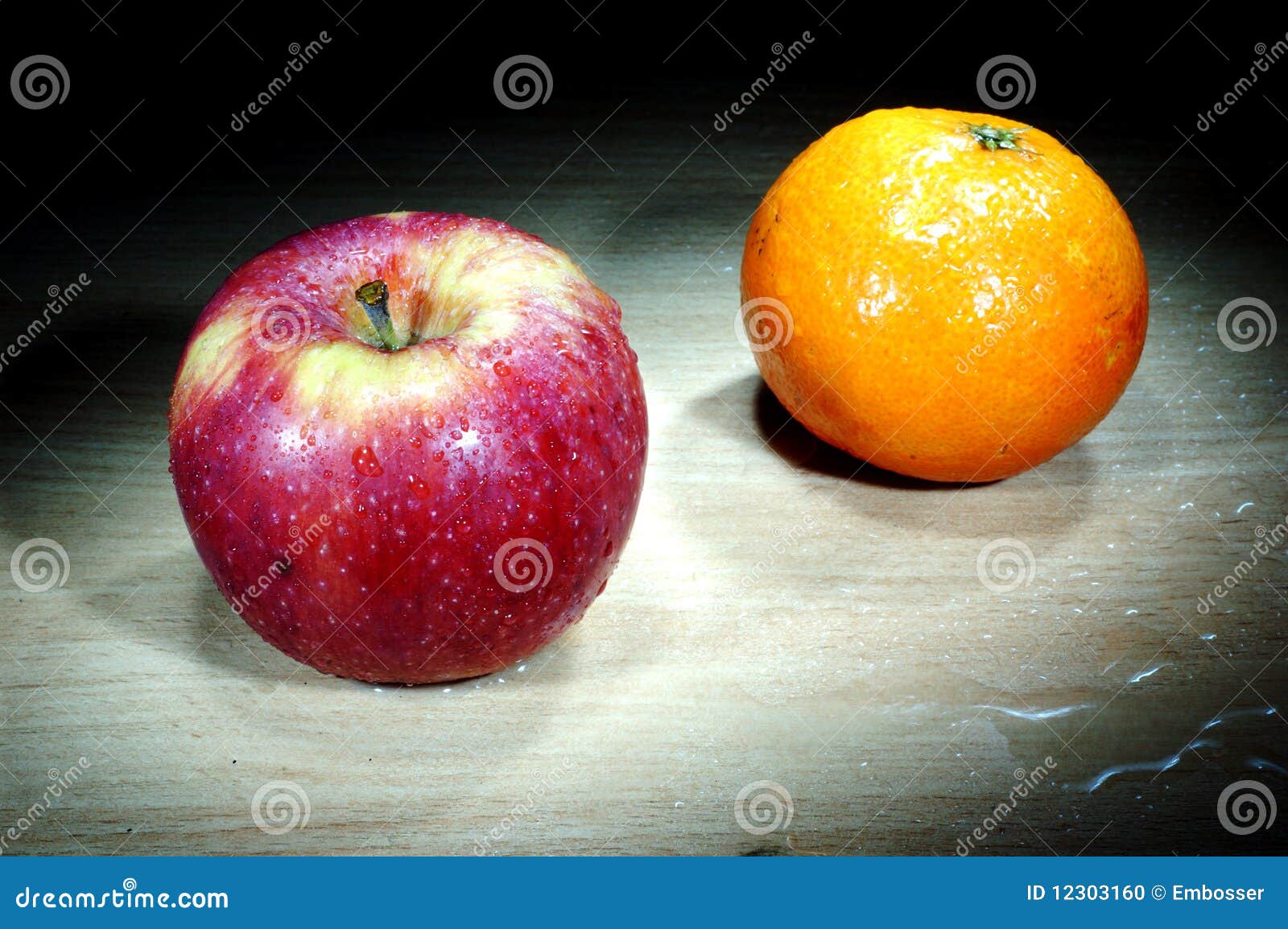 Apple and Orange in the Dark Stock Photo - Image of bright, fruit: 12303160