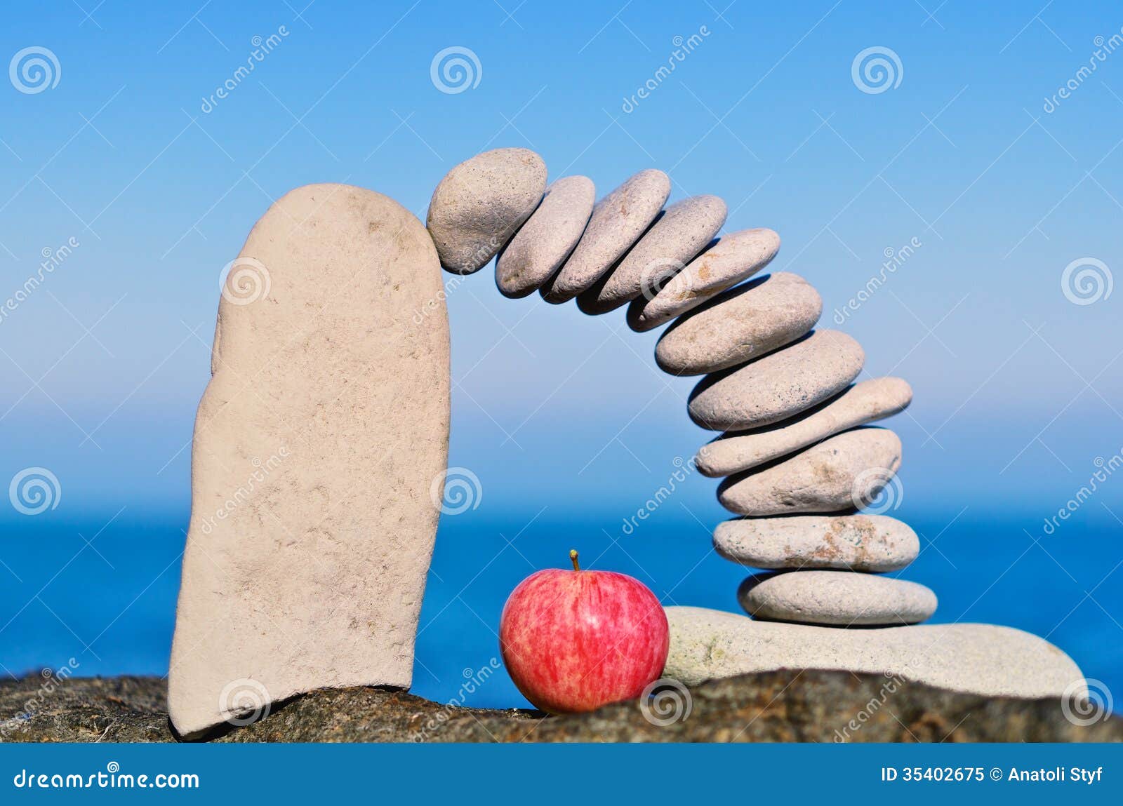 Apple and pebbles stock image. Image of curve, fulcrum - 35402675