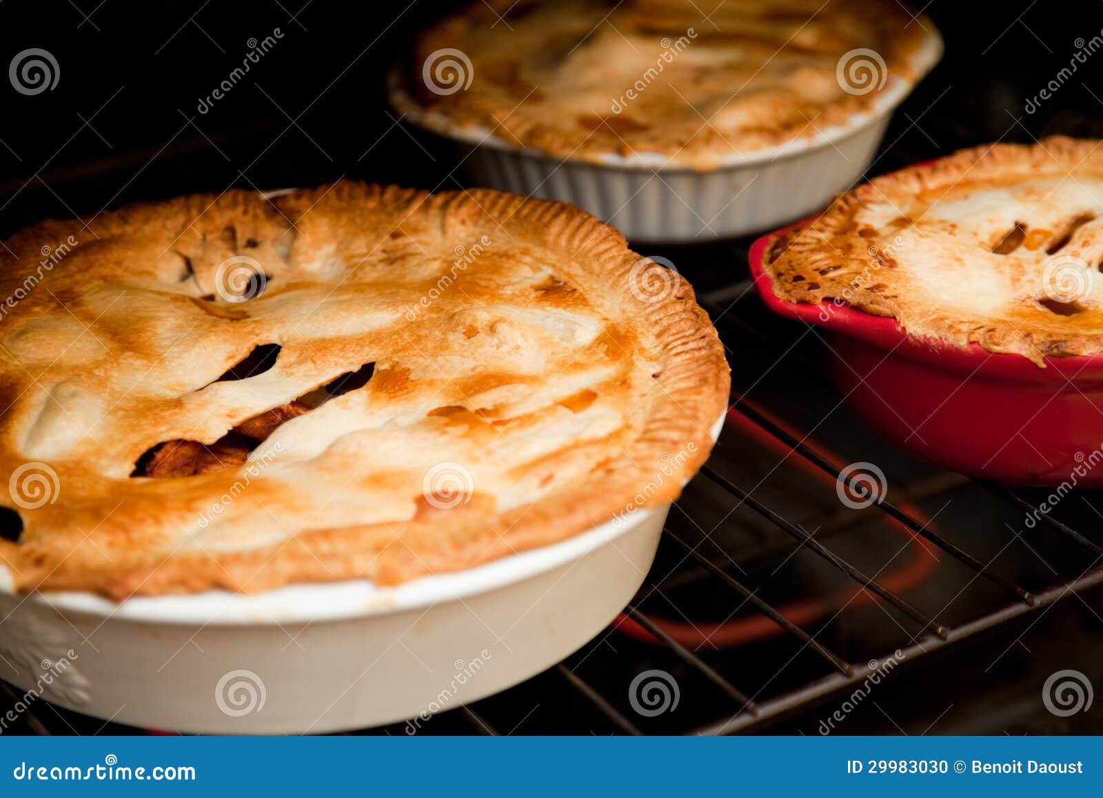 Three Apple Pies Cooking in the Oven Stock Photo - Image of closeup ...