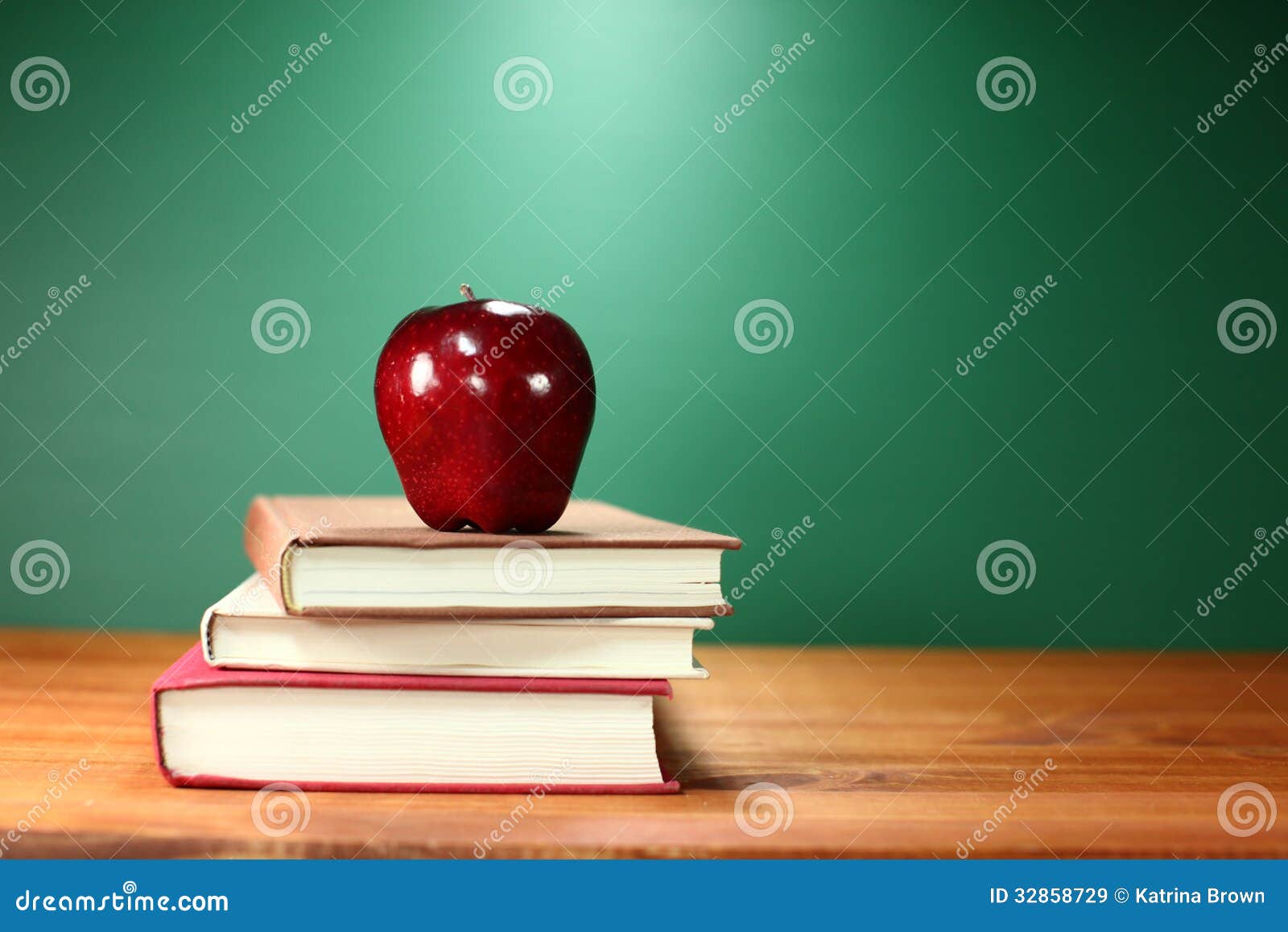 Apple Plus Stack of Books on a Desk for Back To School Stock Image ...