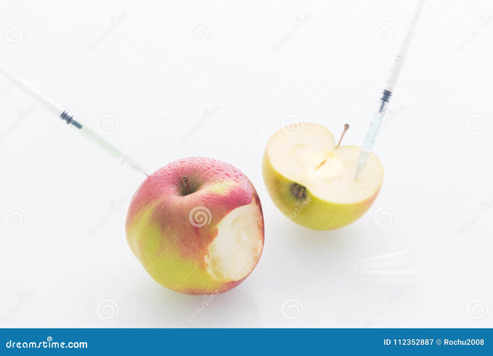 Apple with Punched Needles and Syringes As a Concept for Modified Food ...