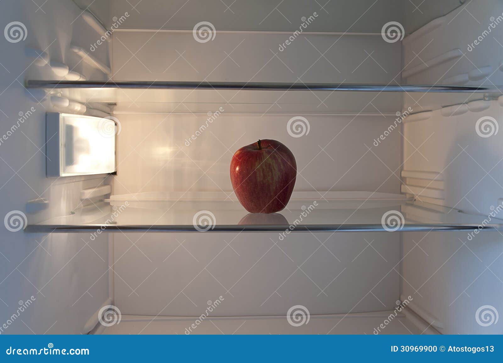 Apple in the refrigerator stock photo. Image of snack - 30969900