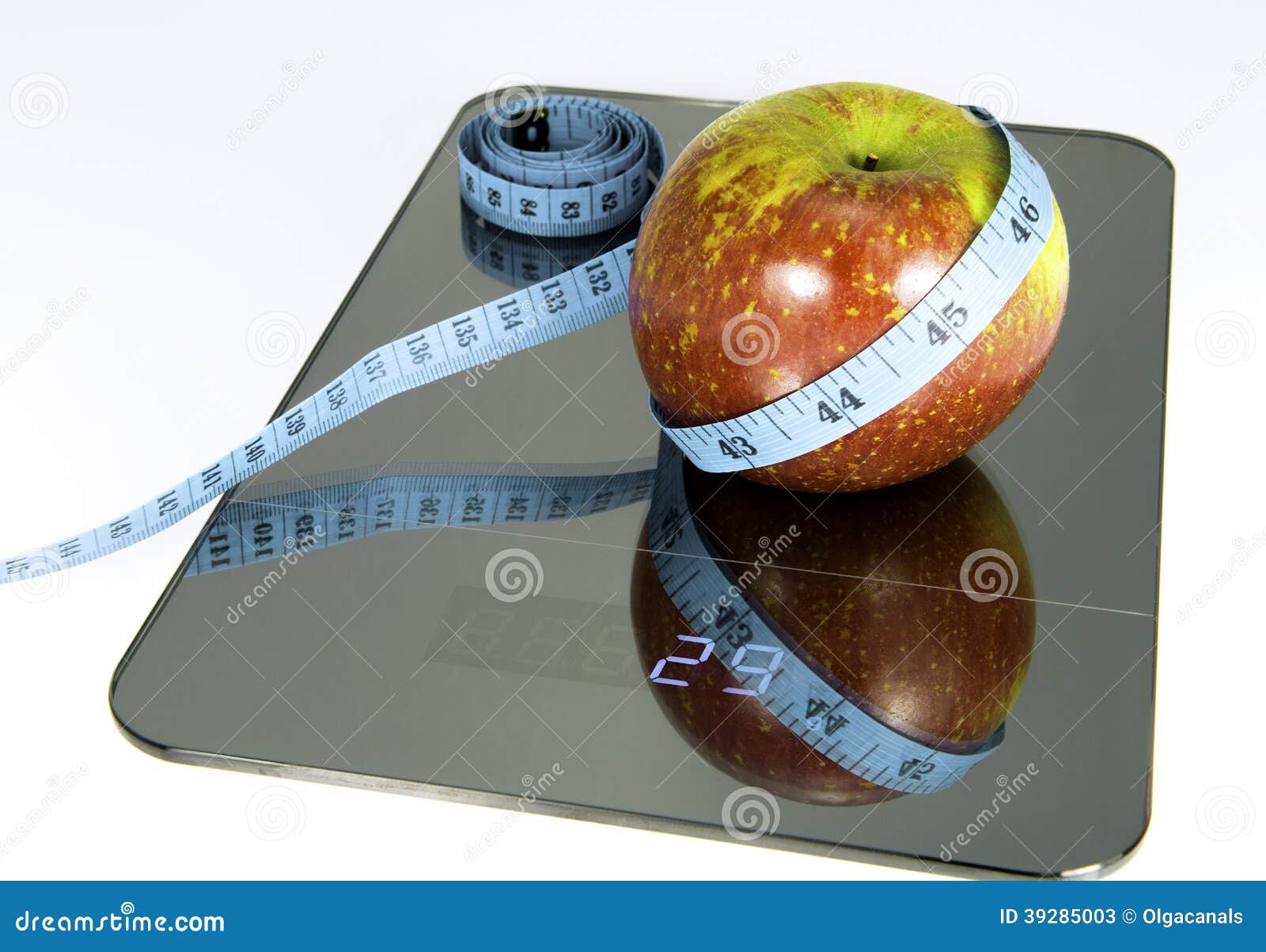 Apple on the scale. stock image. Image of conceptual - 39285003