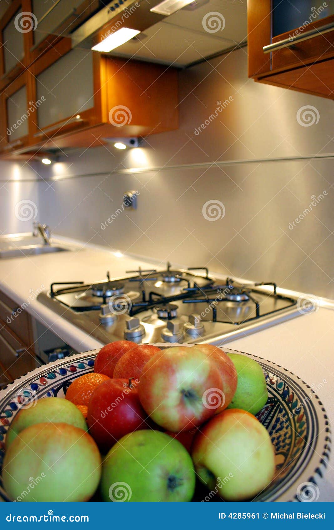 Apple in silver kitchen. stock image. Image of home, cook - 4285961