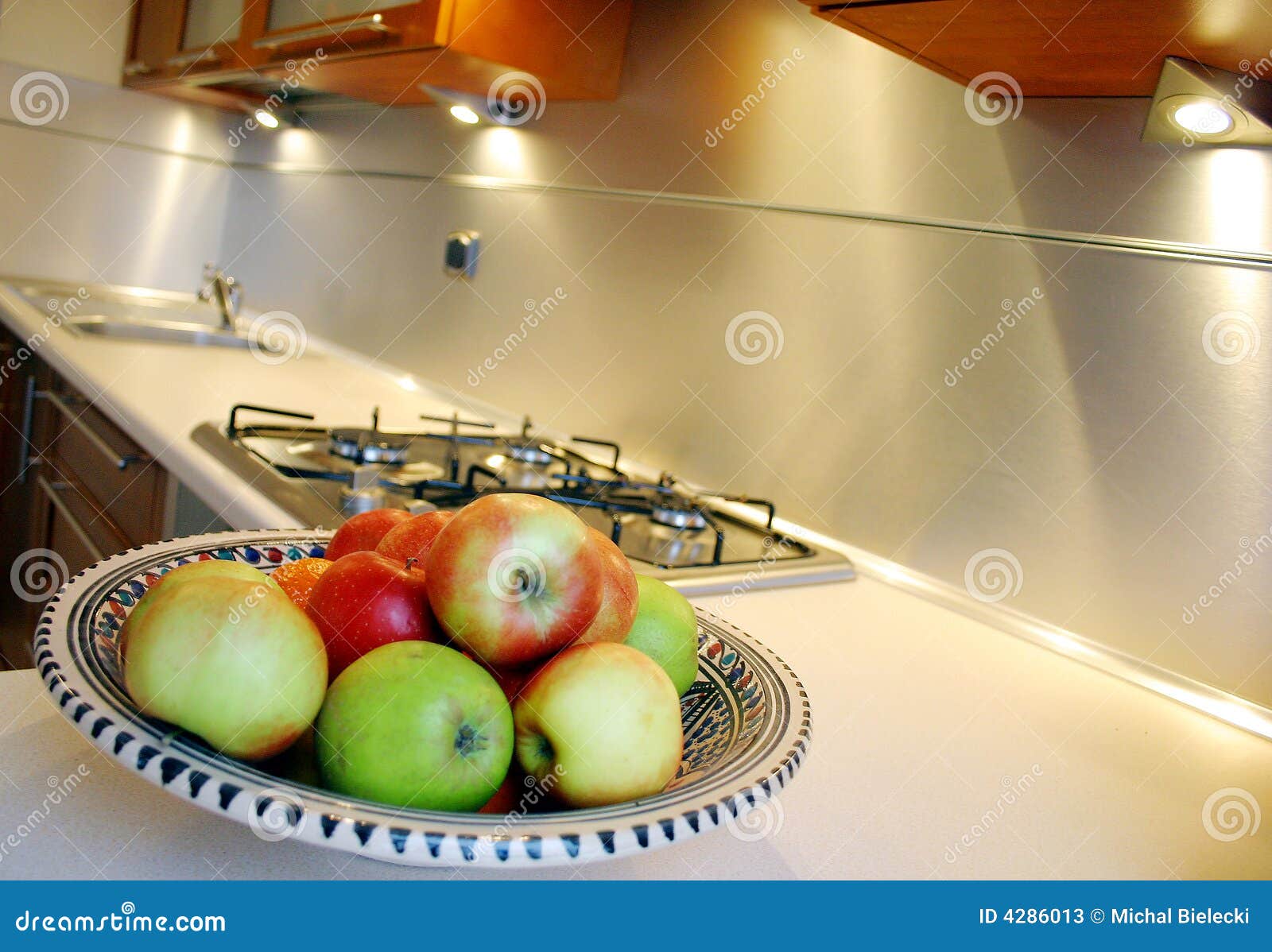 Apple in silver kitchen. stock image. Image of tool, kitchens - 4286013