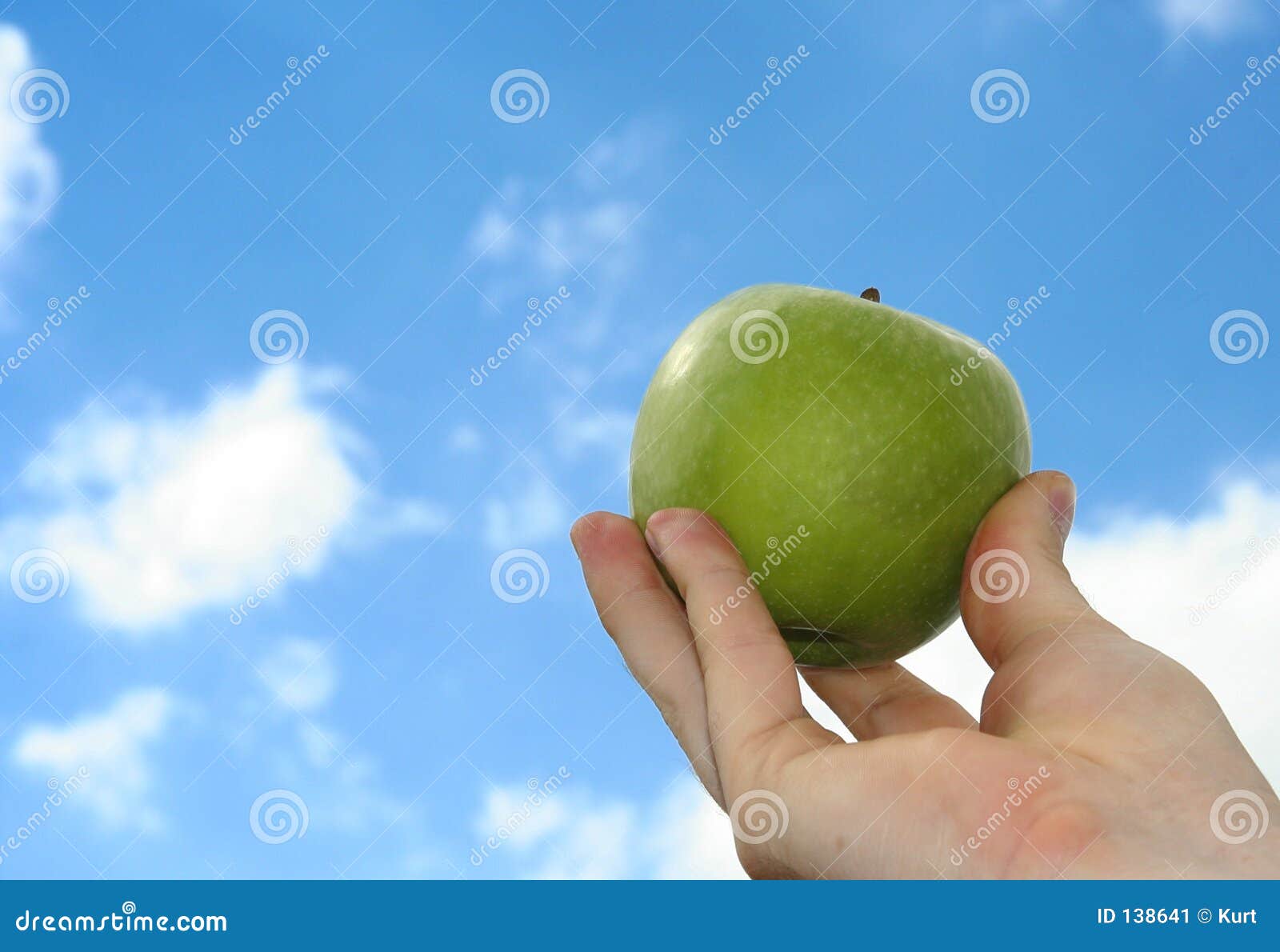 Apple and sky stock image. Image of holding, white, show - 138641