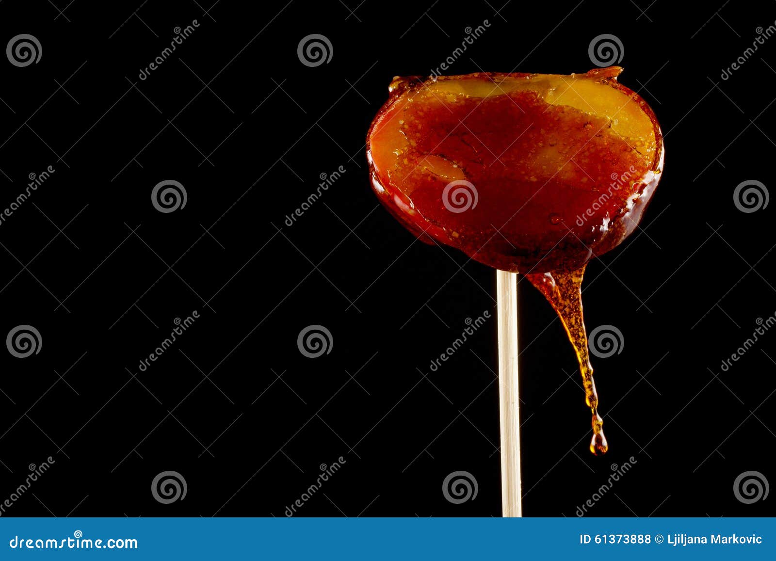 Apple Slice Dipped in Caramel Stock Photo - Image of domestic ...