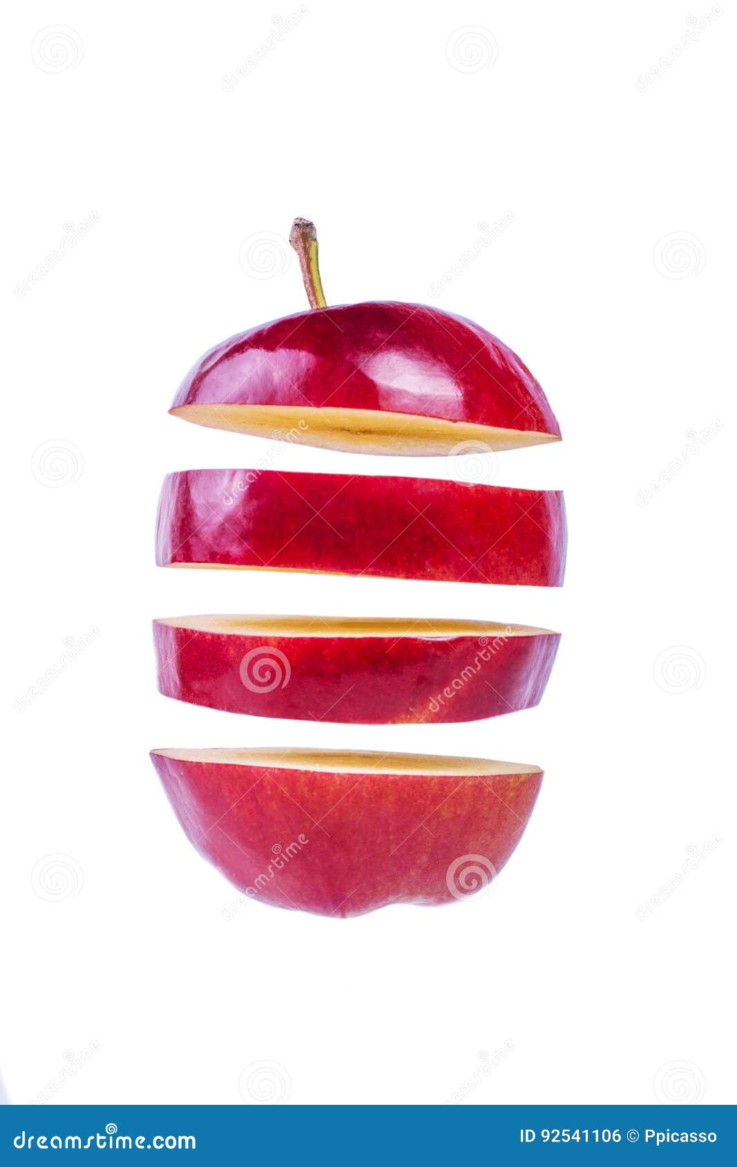 Apple Slices Flying in the Air Isolated on White Background Stock Photo ...