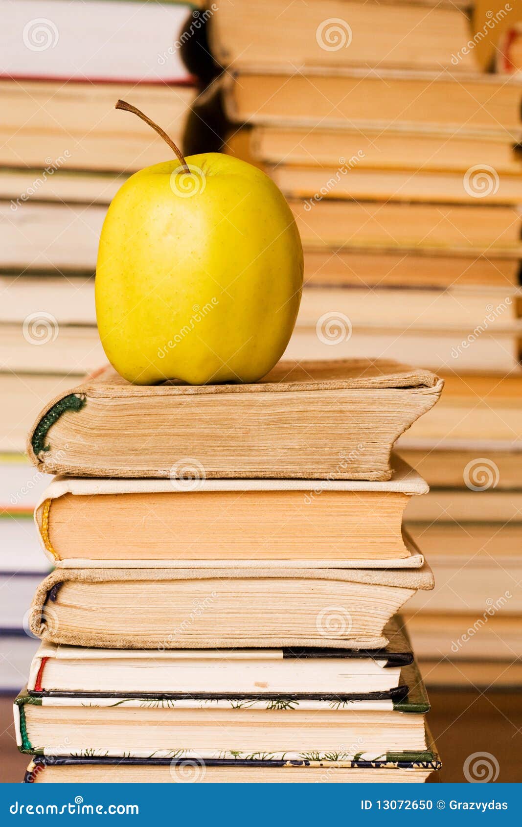 Apple on stack of books stock photo. Image of teach, learn - 13072650