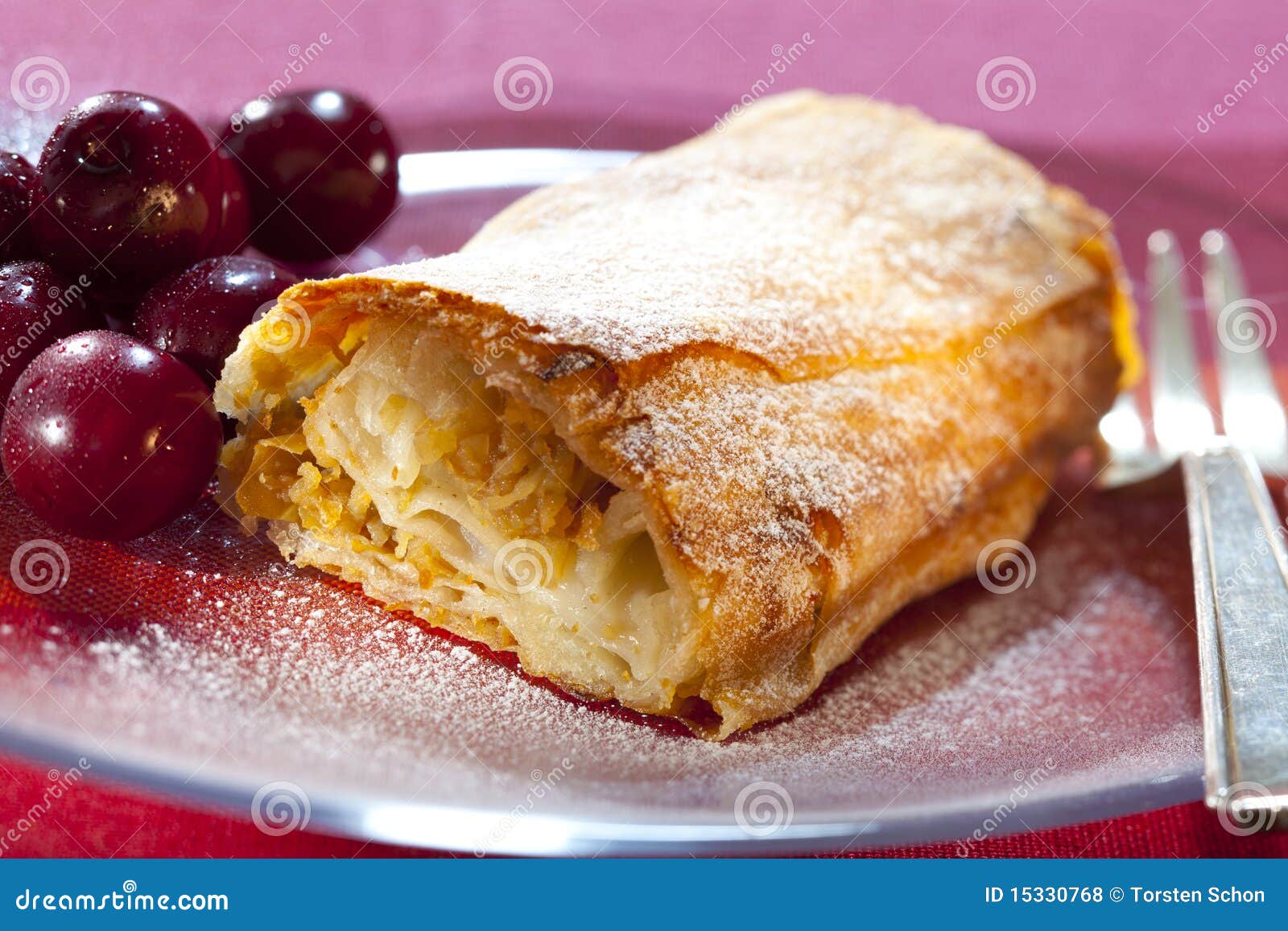 Apple Strudel with Hot Cherries Stock Photo - Image of icing, plate ...