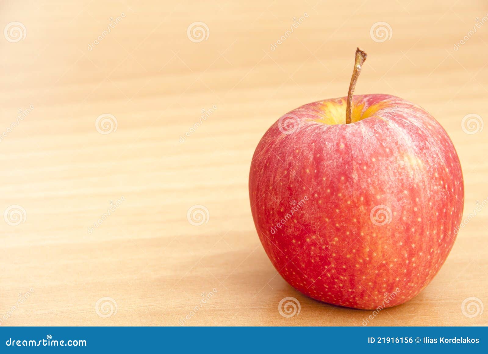 Apple on table stock photo. Image of food, healthy, wellbeing - 21916156