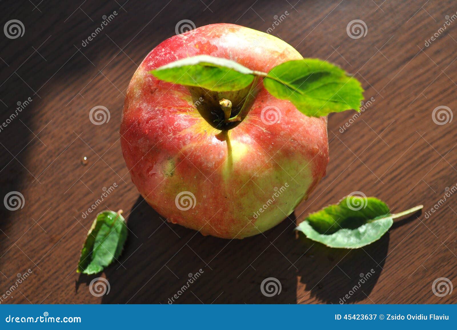 Apple on the table stock image. Image of juicy, delicious - 45423637