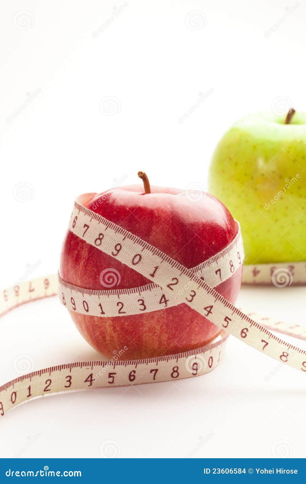 Apple with a tape measure stock photo. Image of juicy - 23606584