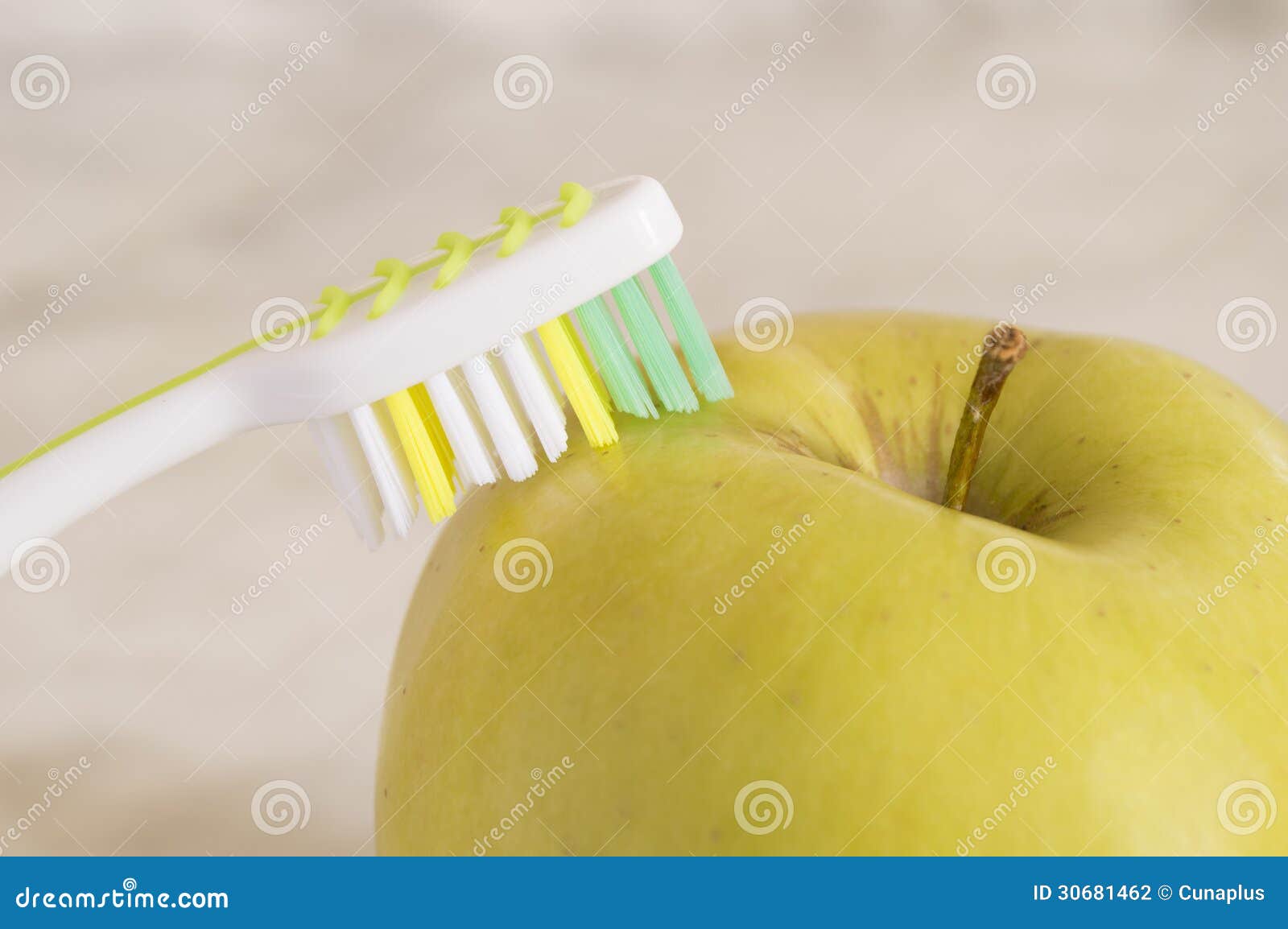 Apple with a toothbrush stock photo. Image of bright - 30681462