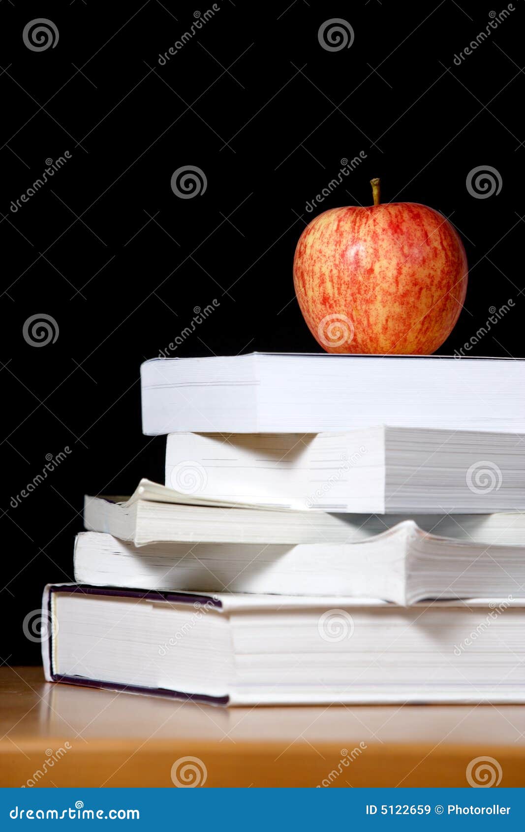 An Apple on Top of a Stack of Books Stock Image - Image of class, data ...