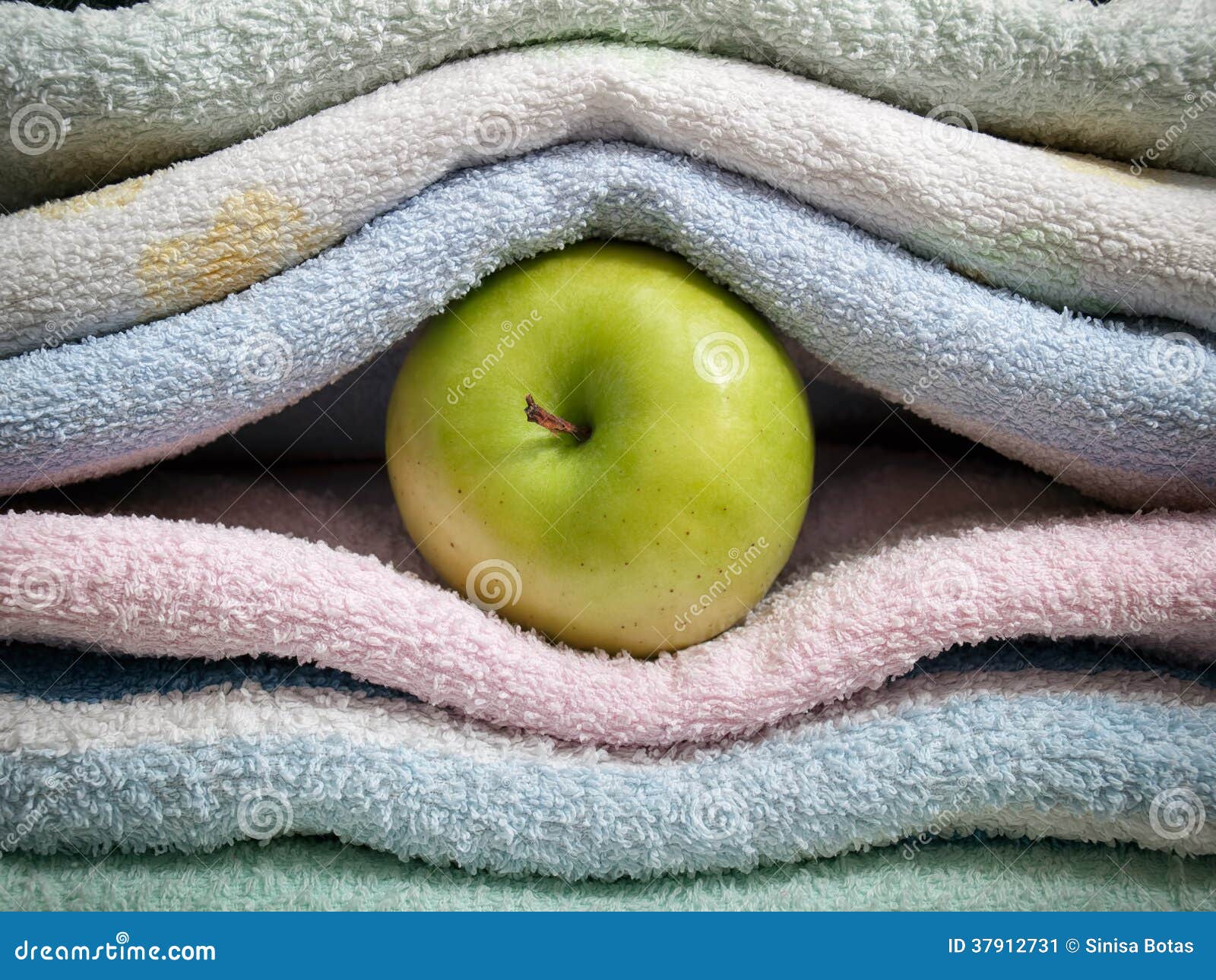 Apple and towels stock image. Image of pile, housework - 37912731