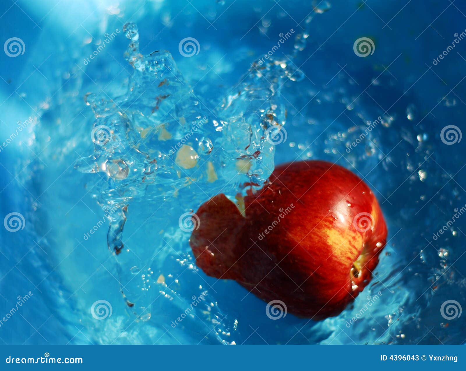 Apple in water stock image. Image of broken, blue, shine - 4396043