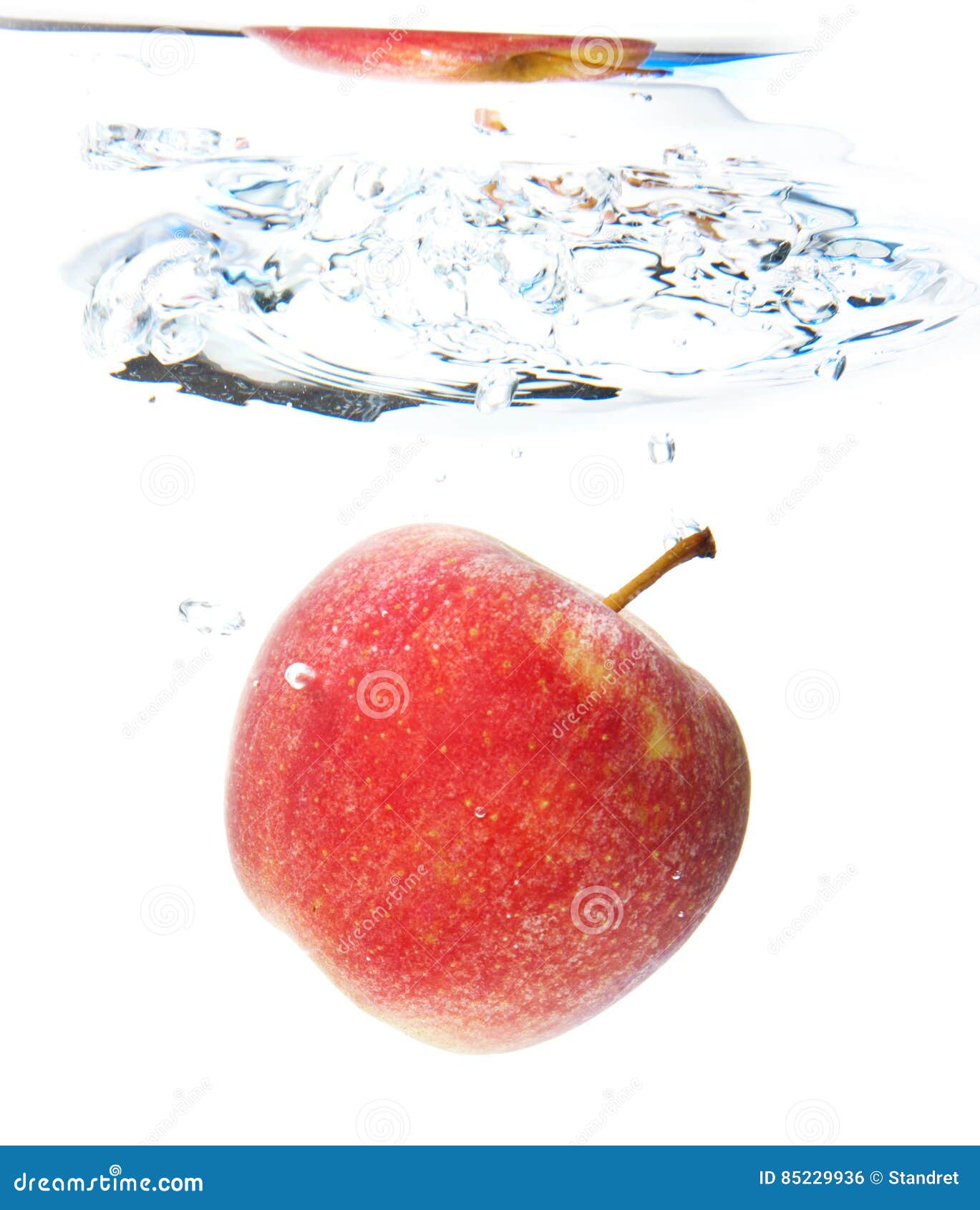 Apple in water stock photo. Image of drop, isolated, clear - 85229936